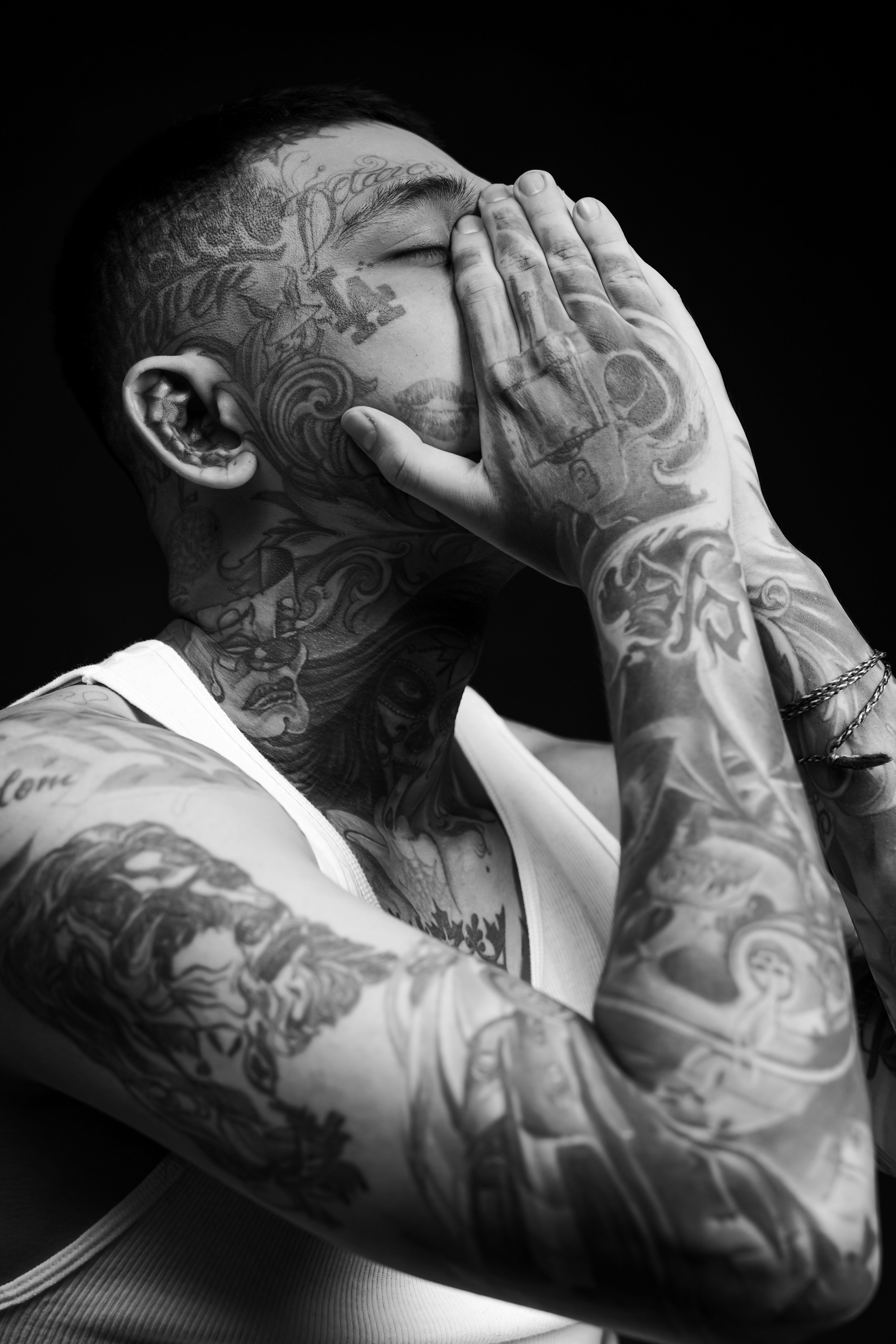 A man with tattoos covering his face · Free Stock Photo