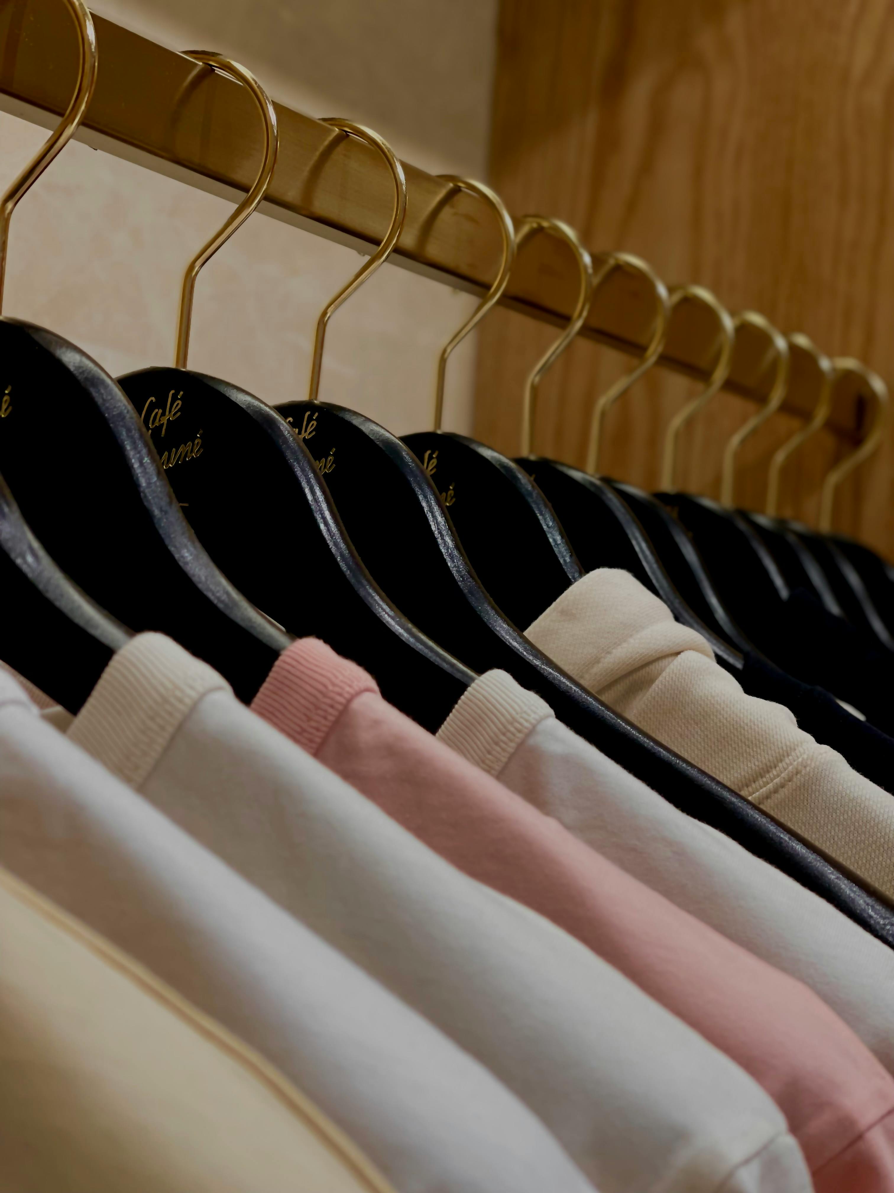 Row of Clothes on Hangers · Free Stock Photo