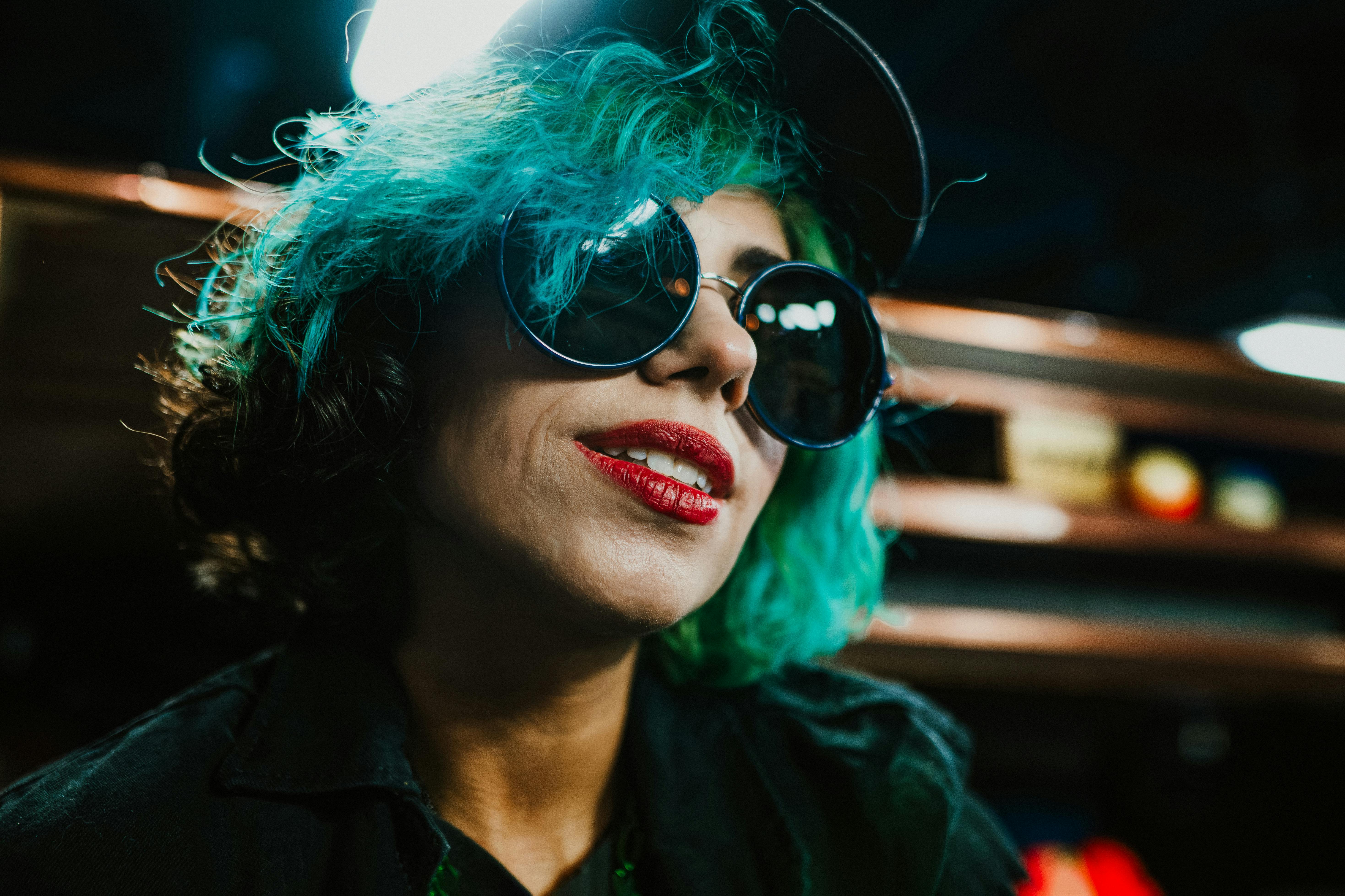 Woman in Cap, Sunglasses and with Blue Hair · Free Stock Photo