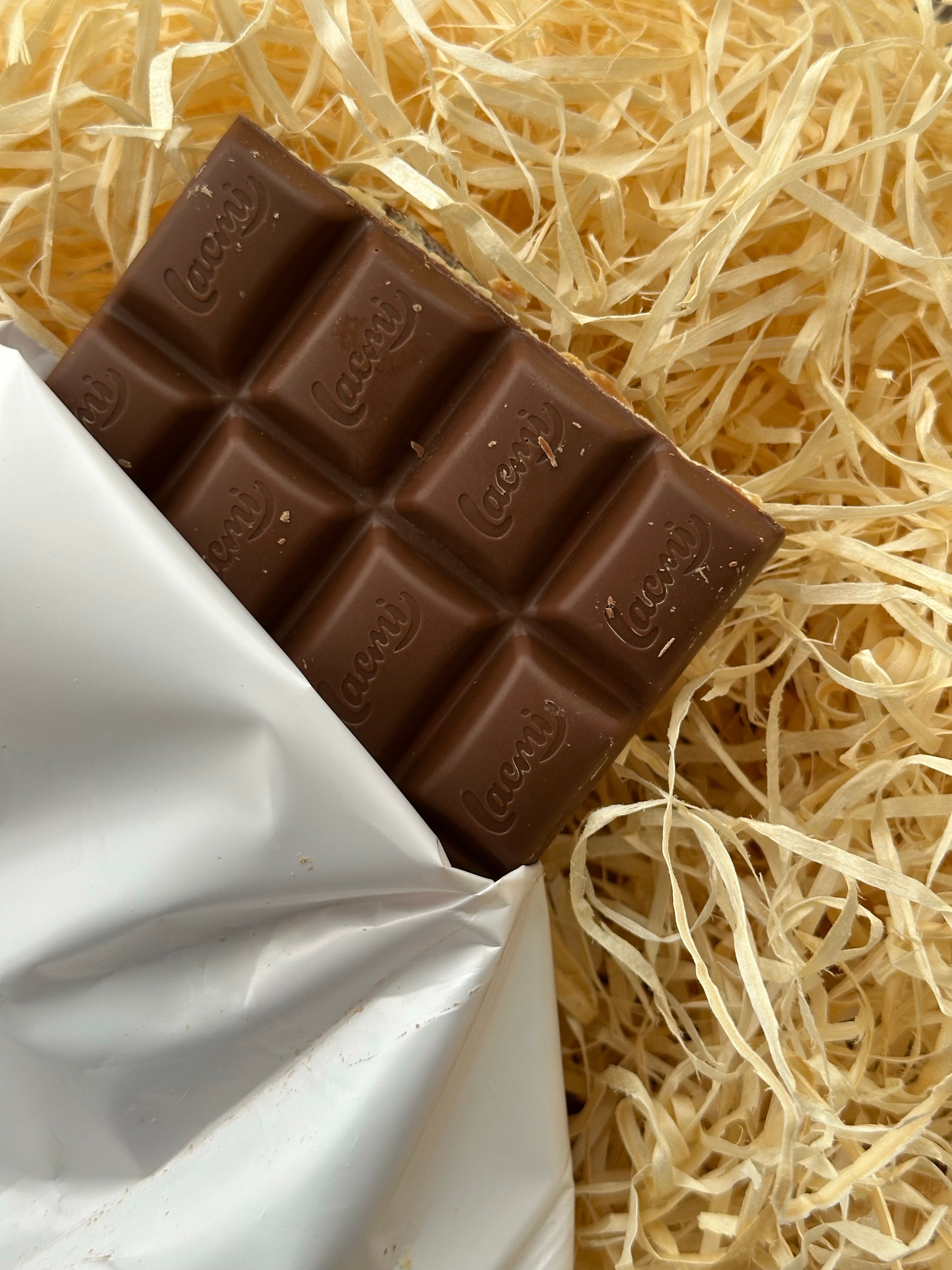 Lacmi Milk Chocolate Bar in Plastic Packaging · Free Stock Photo