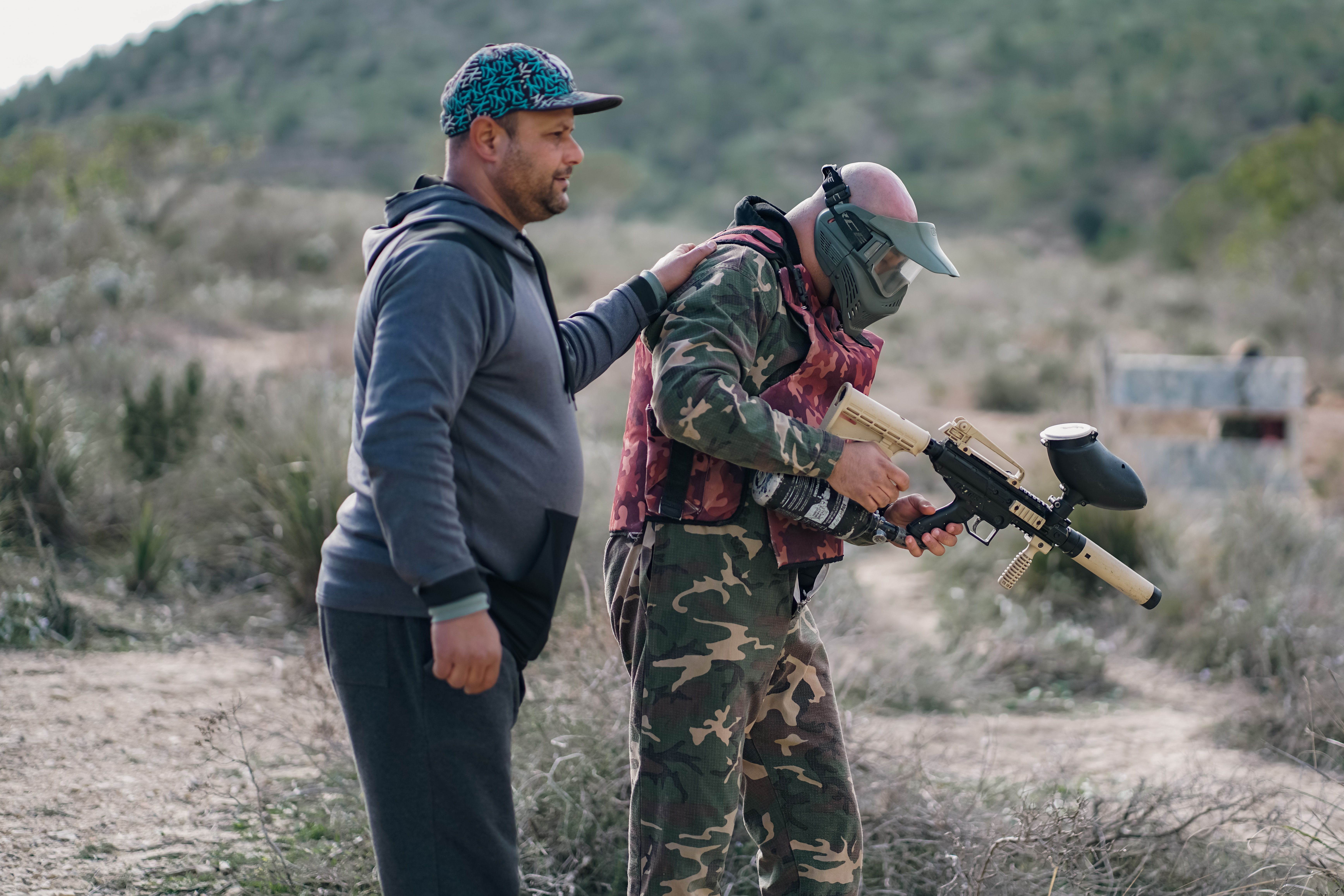 Men with Paintball Rifle · Free Stock Photo