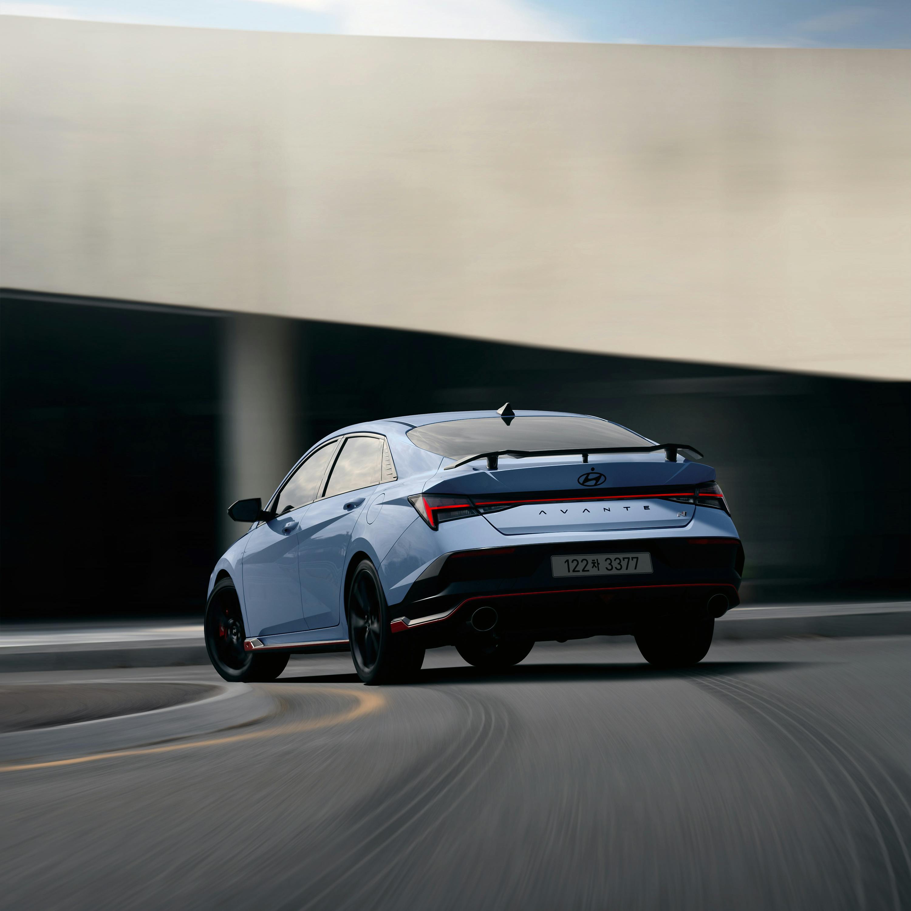 Dynamic Blue Hyundai Avante on the Road · Free Stock Photo