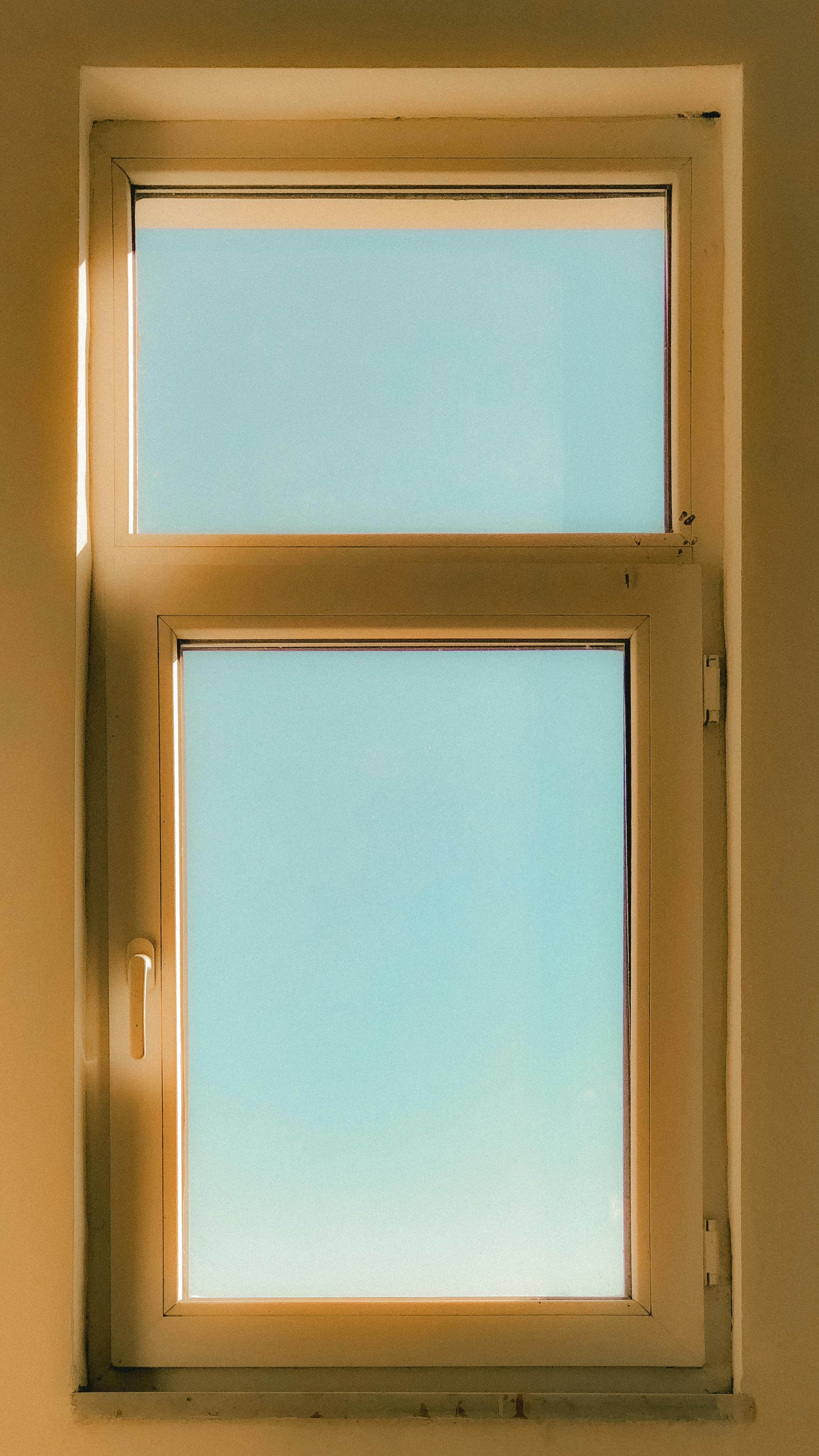 View of Clear, Blue Sky through a Window · Free Stock Photo