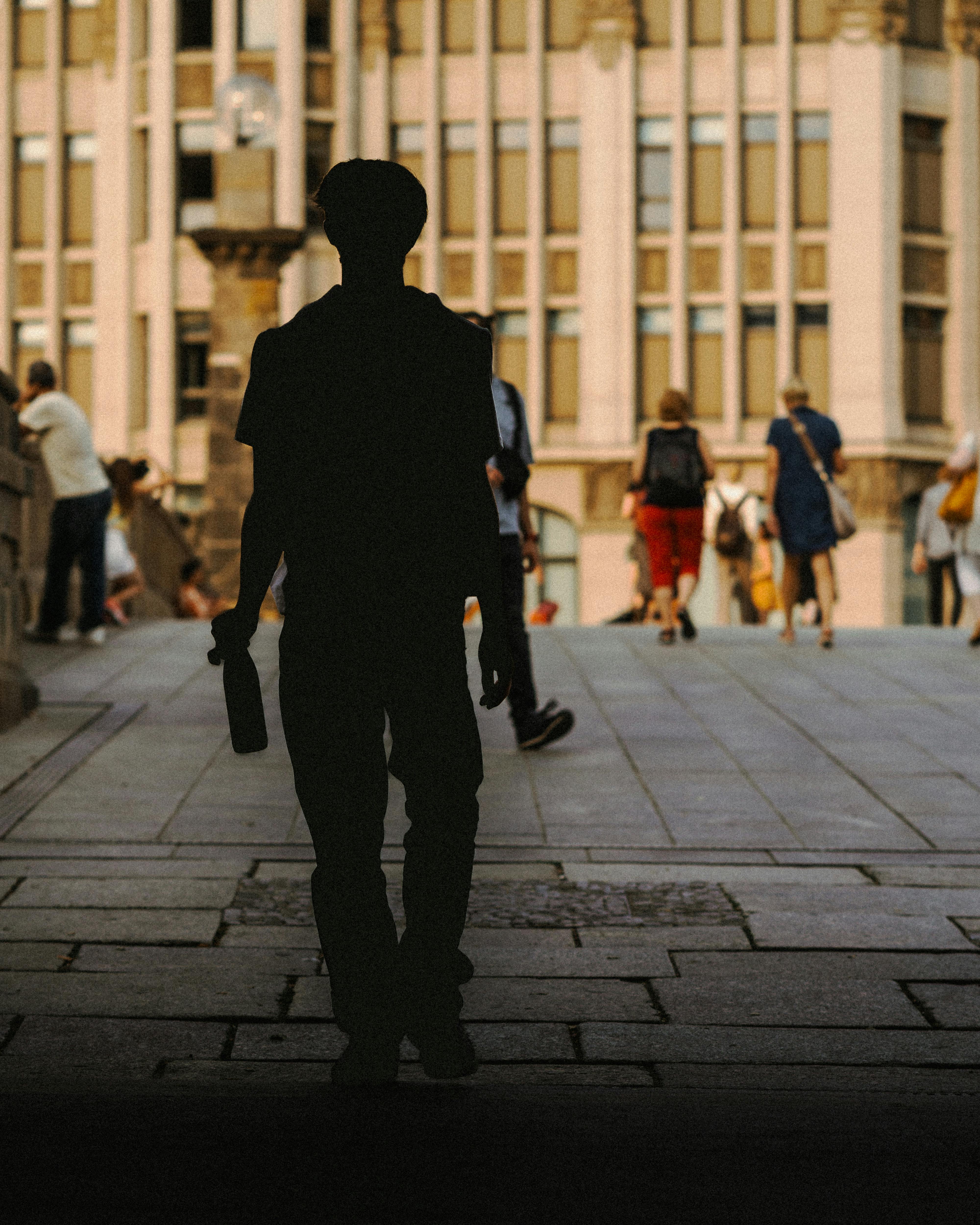 Silhouette of a Passerby Entering the Underpass · Free Stock Photo