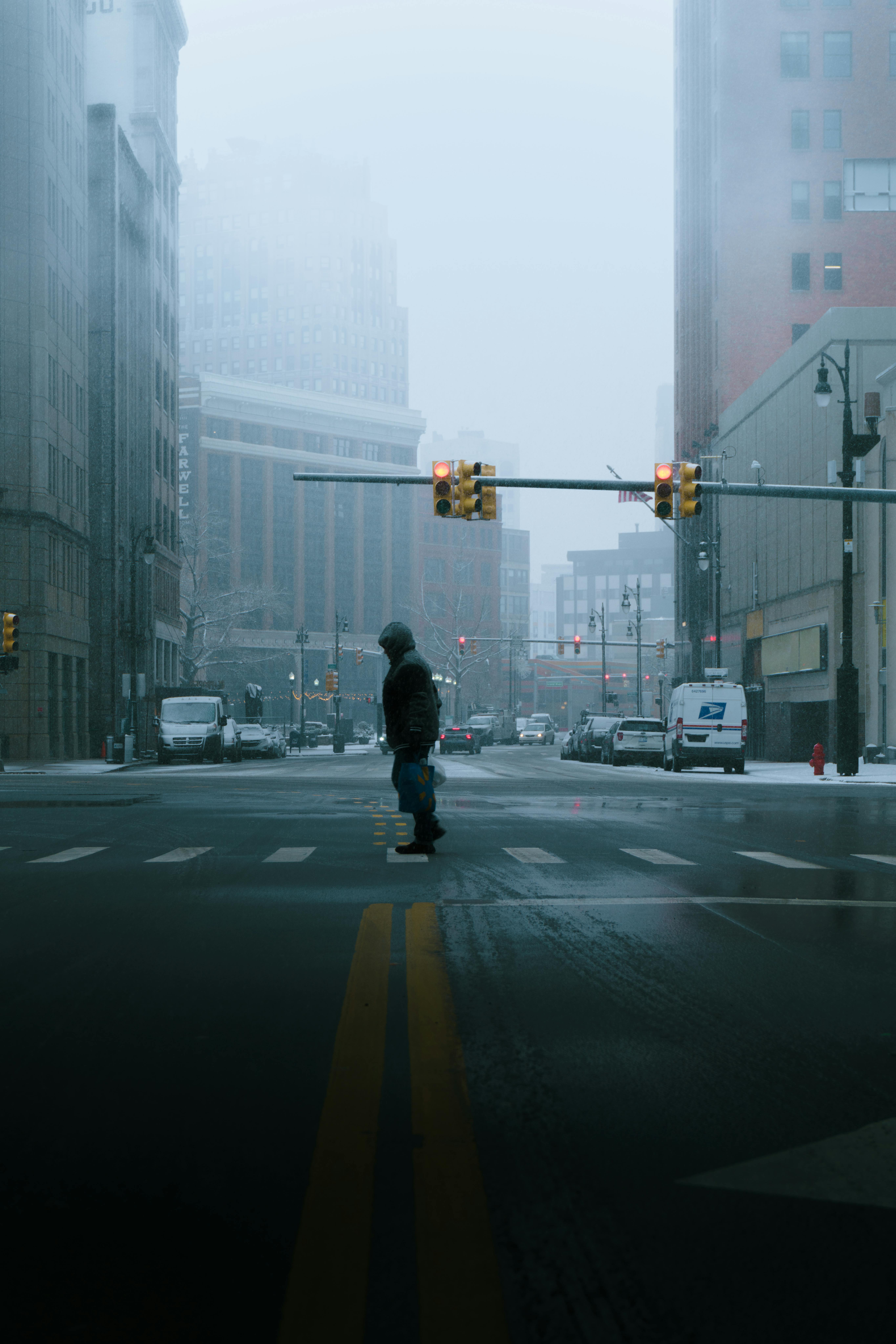 Passerby on the Crosswalk in Winter · Free Stock Photo