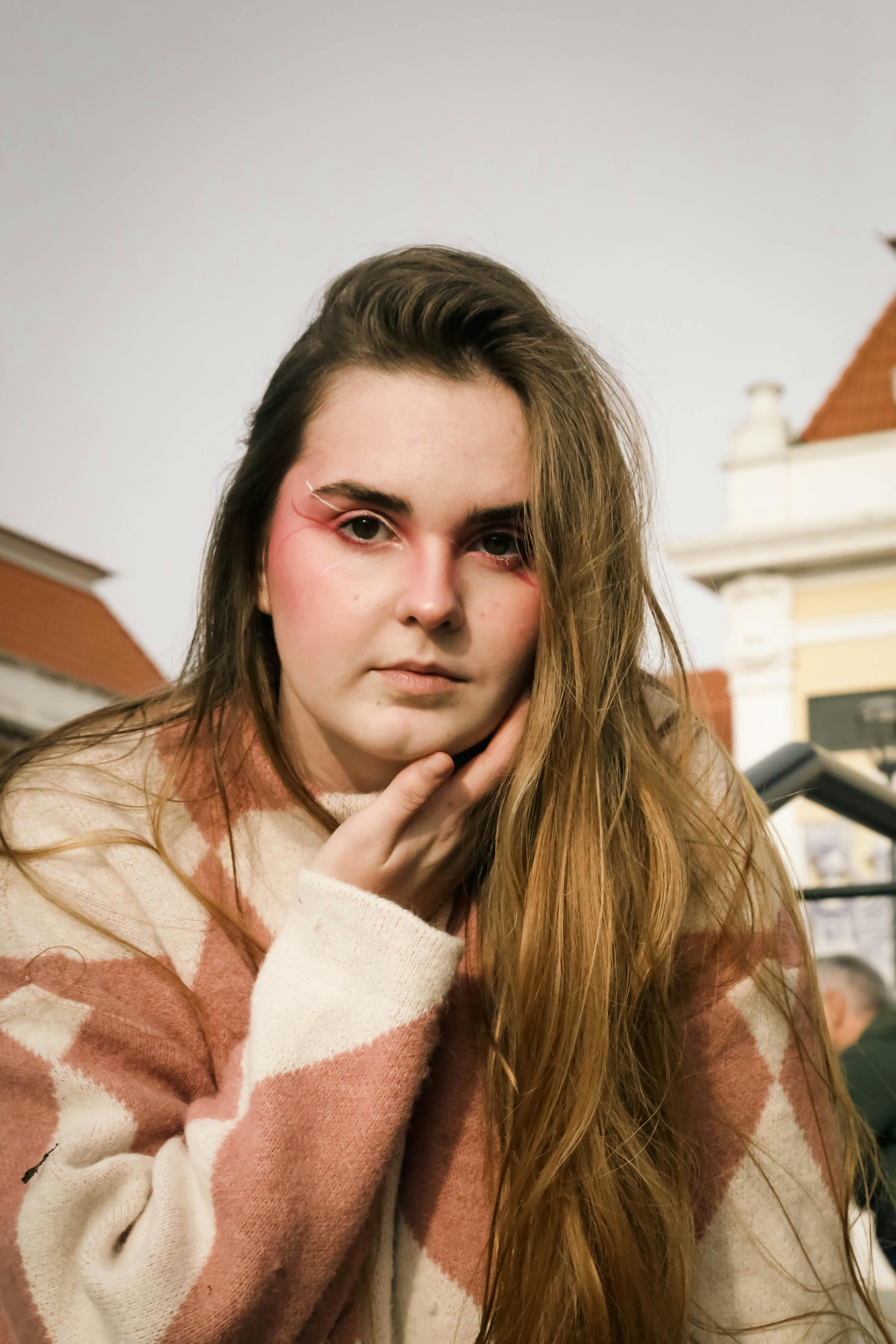 Portrait of Woman with Hand under Cheek · Free Stock Photo