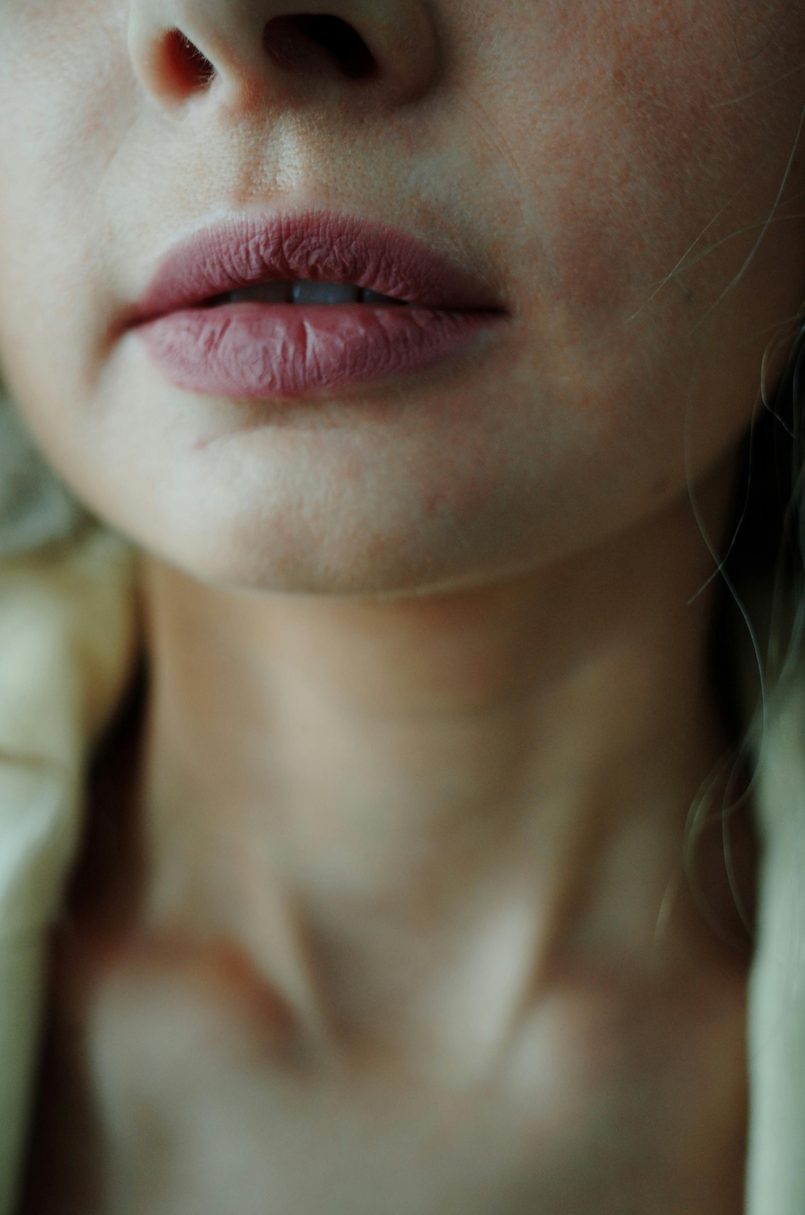 Woman Touching Neck · Free Stock Photo