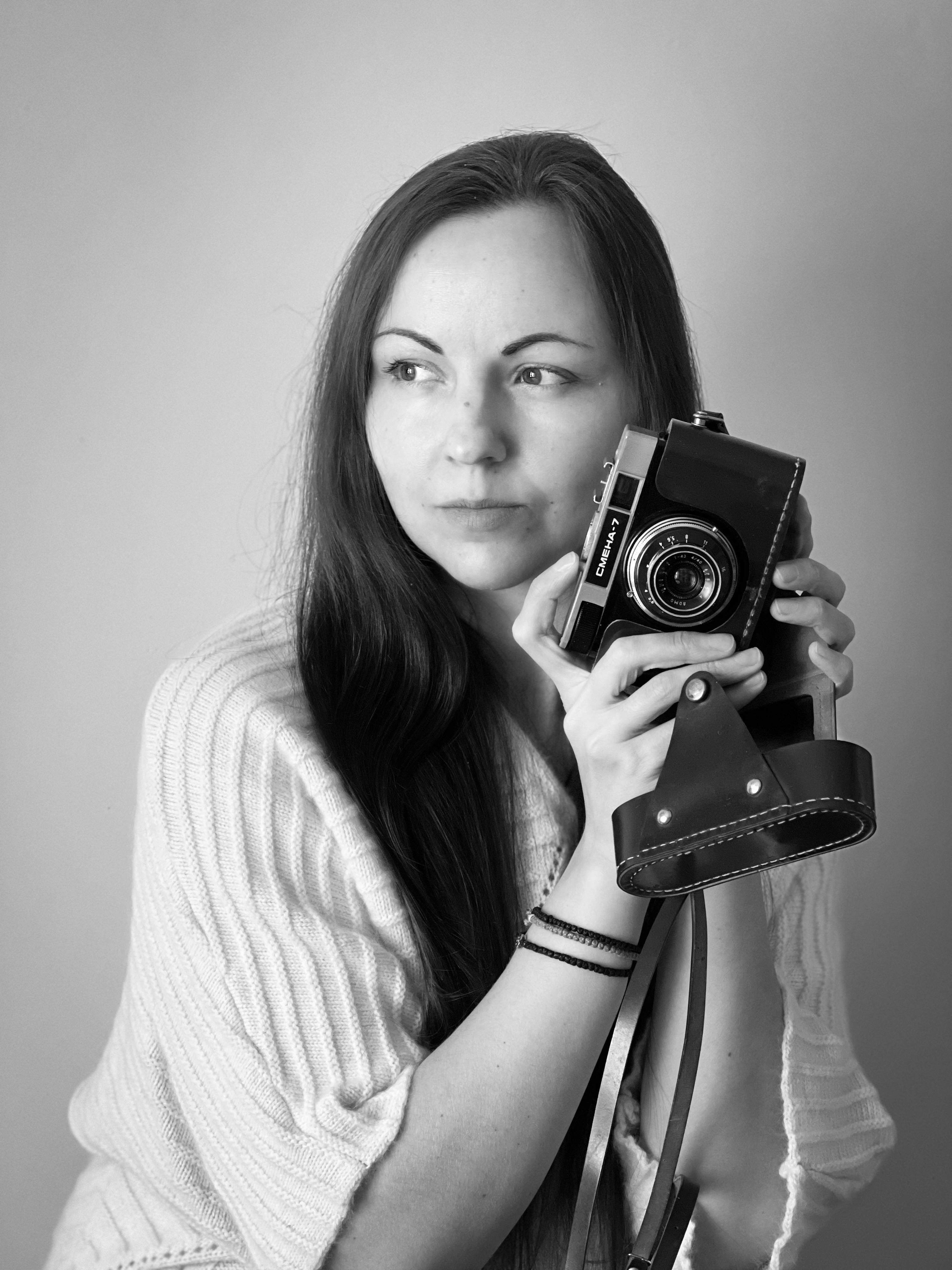 Woman Holding Camera · Free Stock Photo