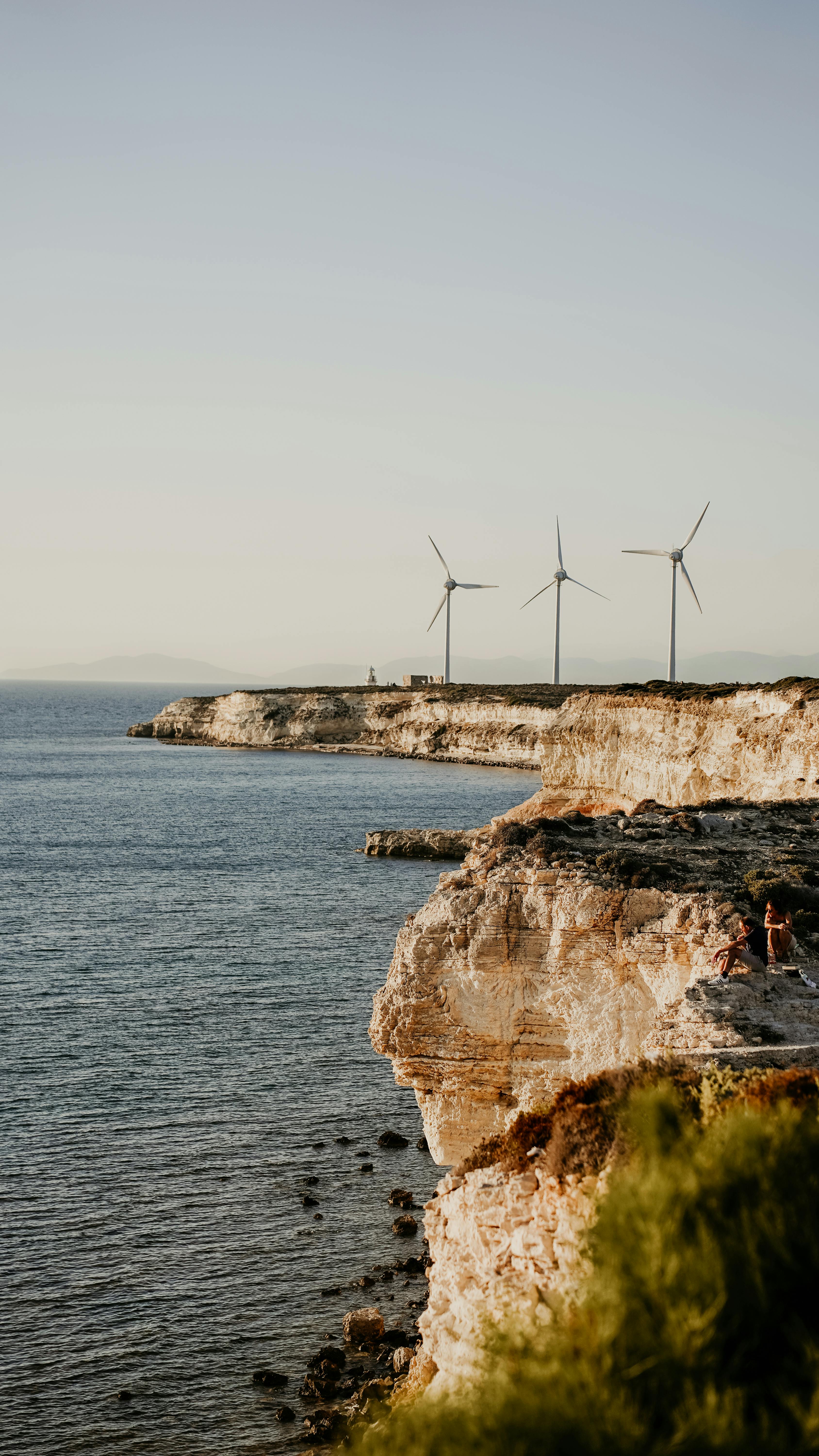 Cliff and Wind Turbines · Free Stock Photo
