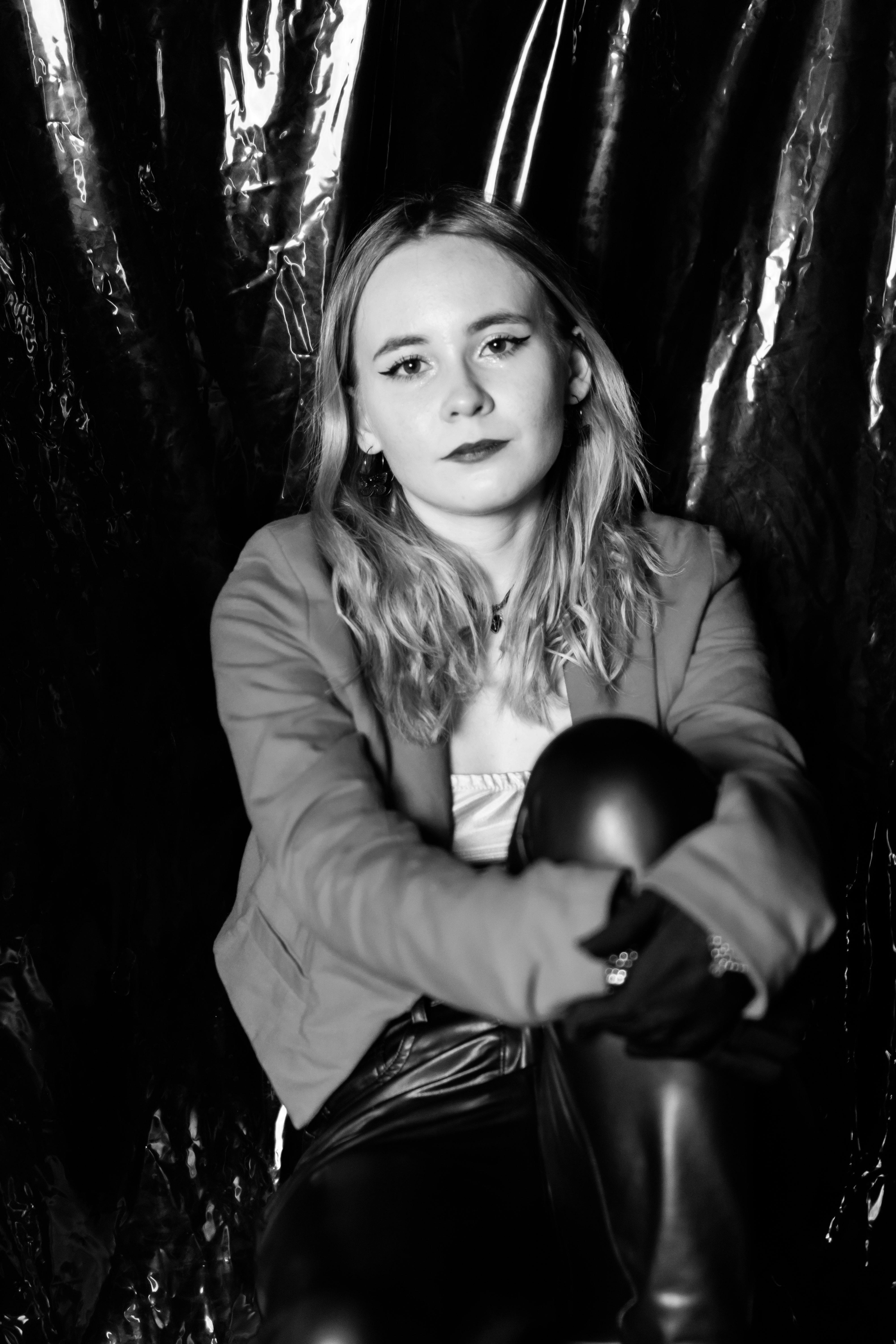 Portrait of Sitting Woman · Free Stock Photo