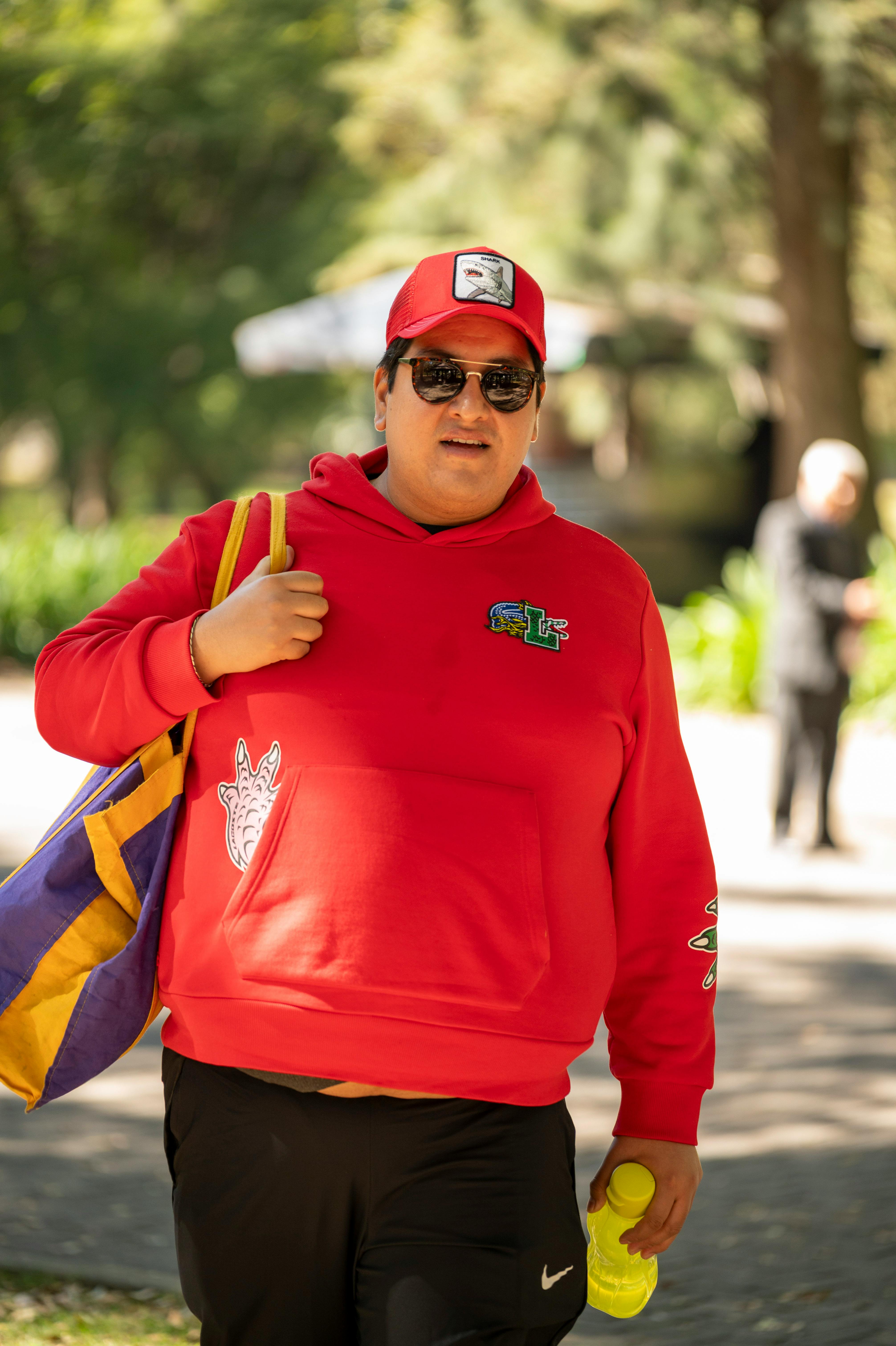 Man Wearing Red Jacket in a Park · Free Stock Photo