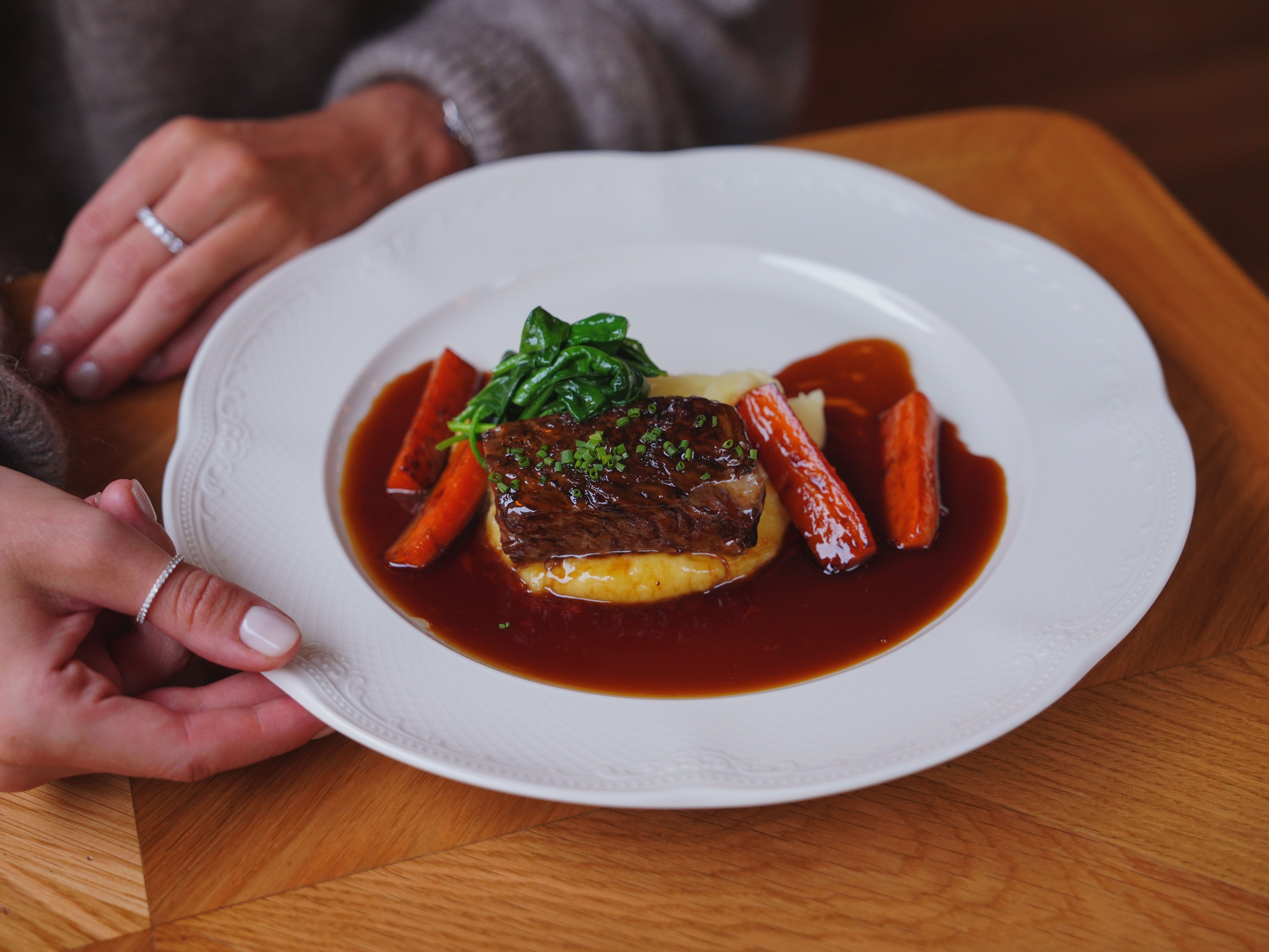 Woman Hands over Plate with Meal · Free Stock Photo