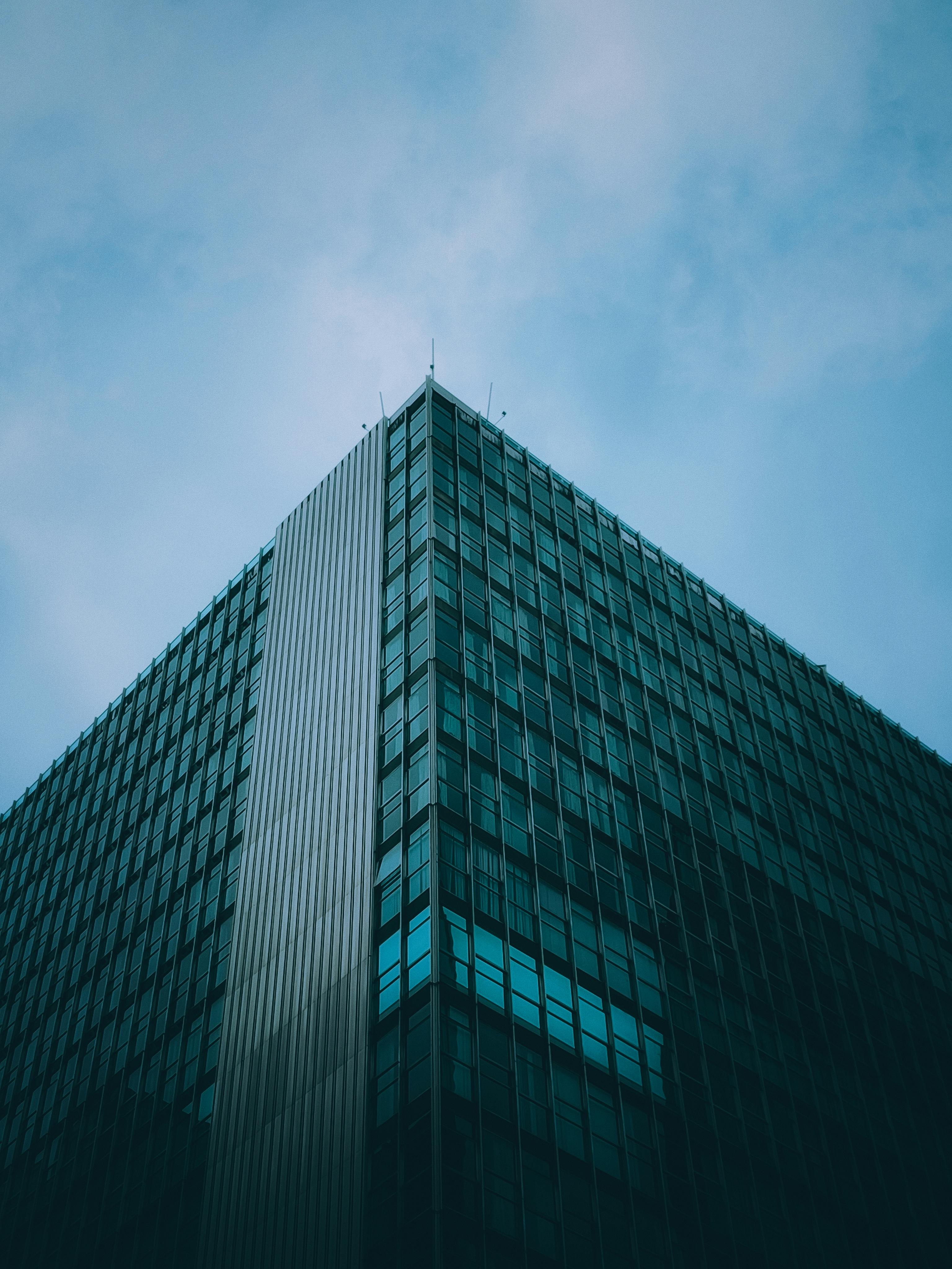 Corner of Glass Modern Skyscraper · Free Stock Photo
