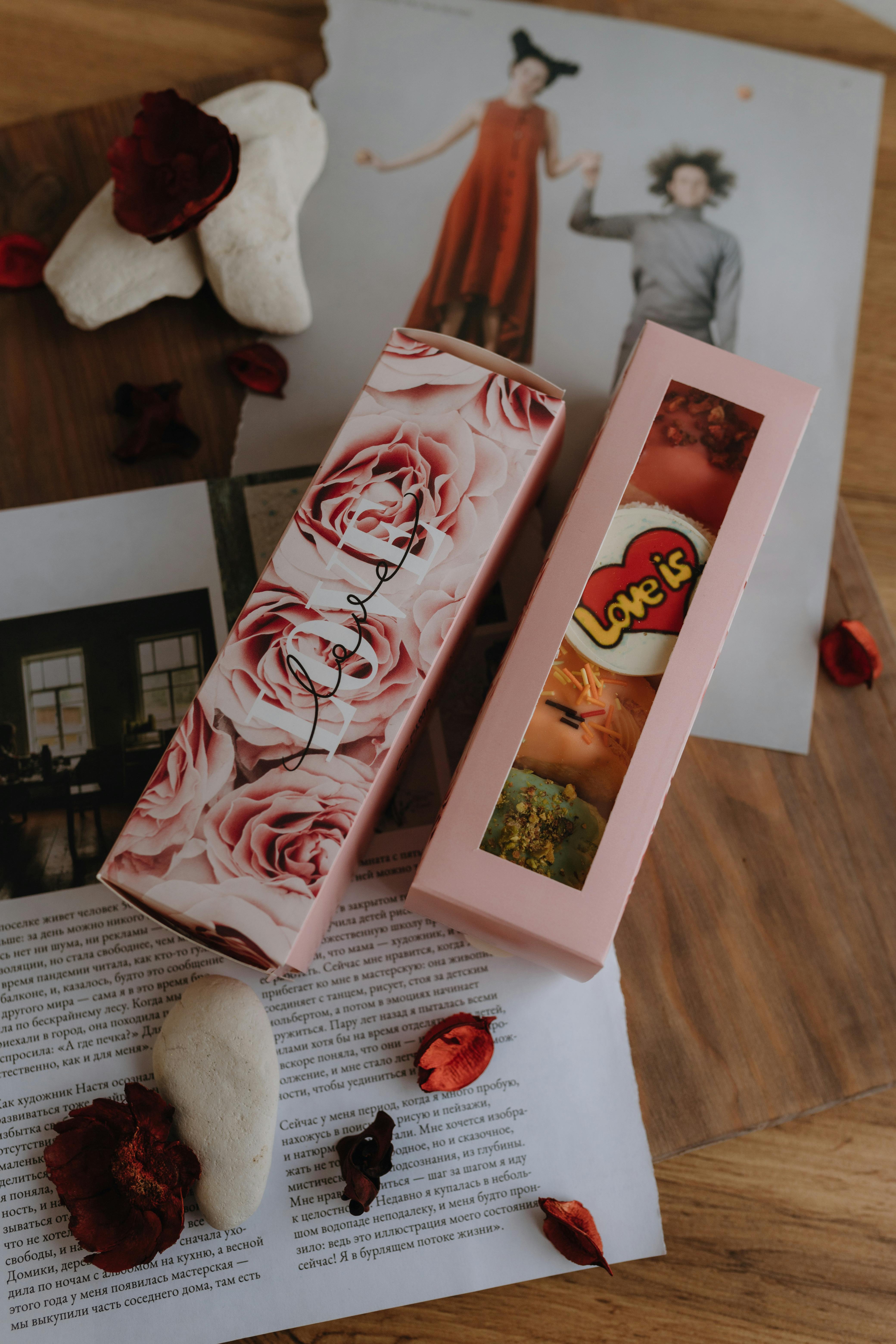 Flowers Petals and Boxes of Cookies · Free Stock Photo