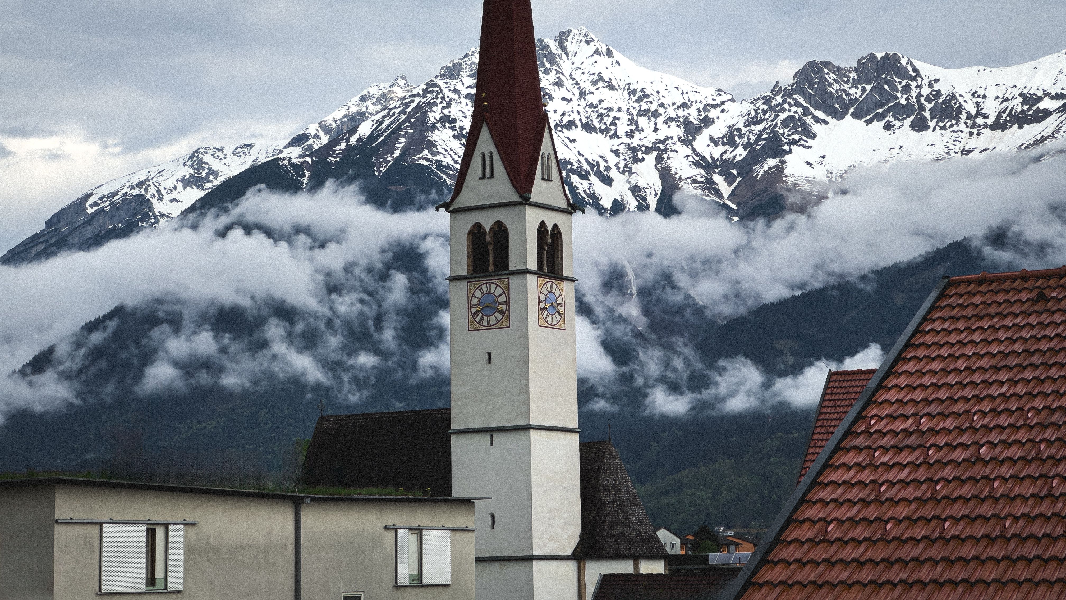 An Austrian Church in front of the Alps · Free Stock Photo