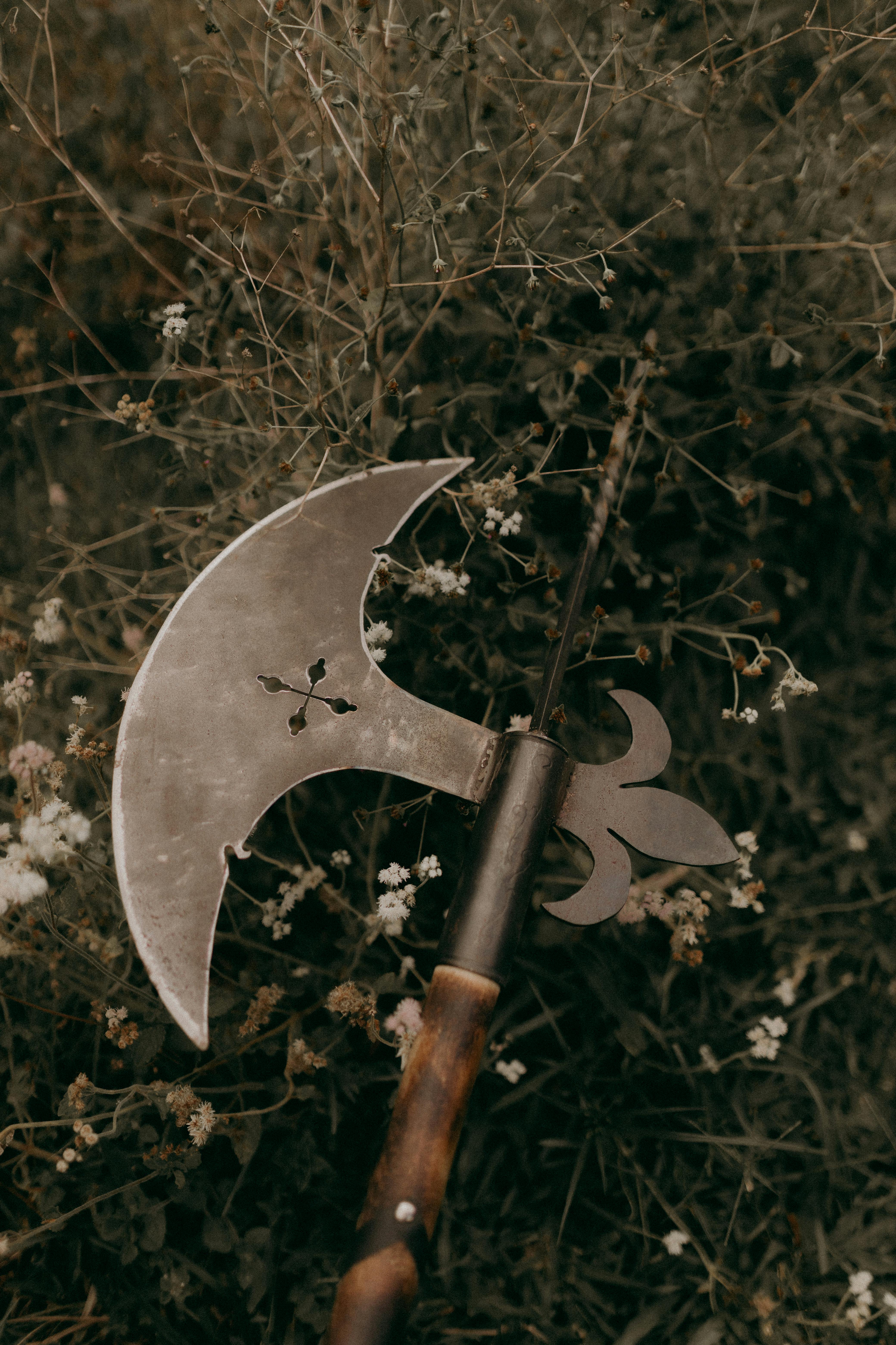 Brown Wooden Axe Besides Brown Leather Knife Holster · Free Stock Photo