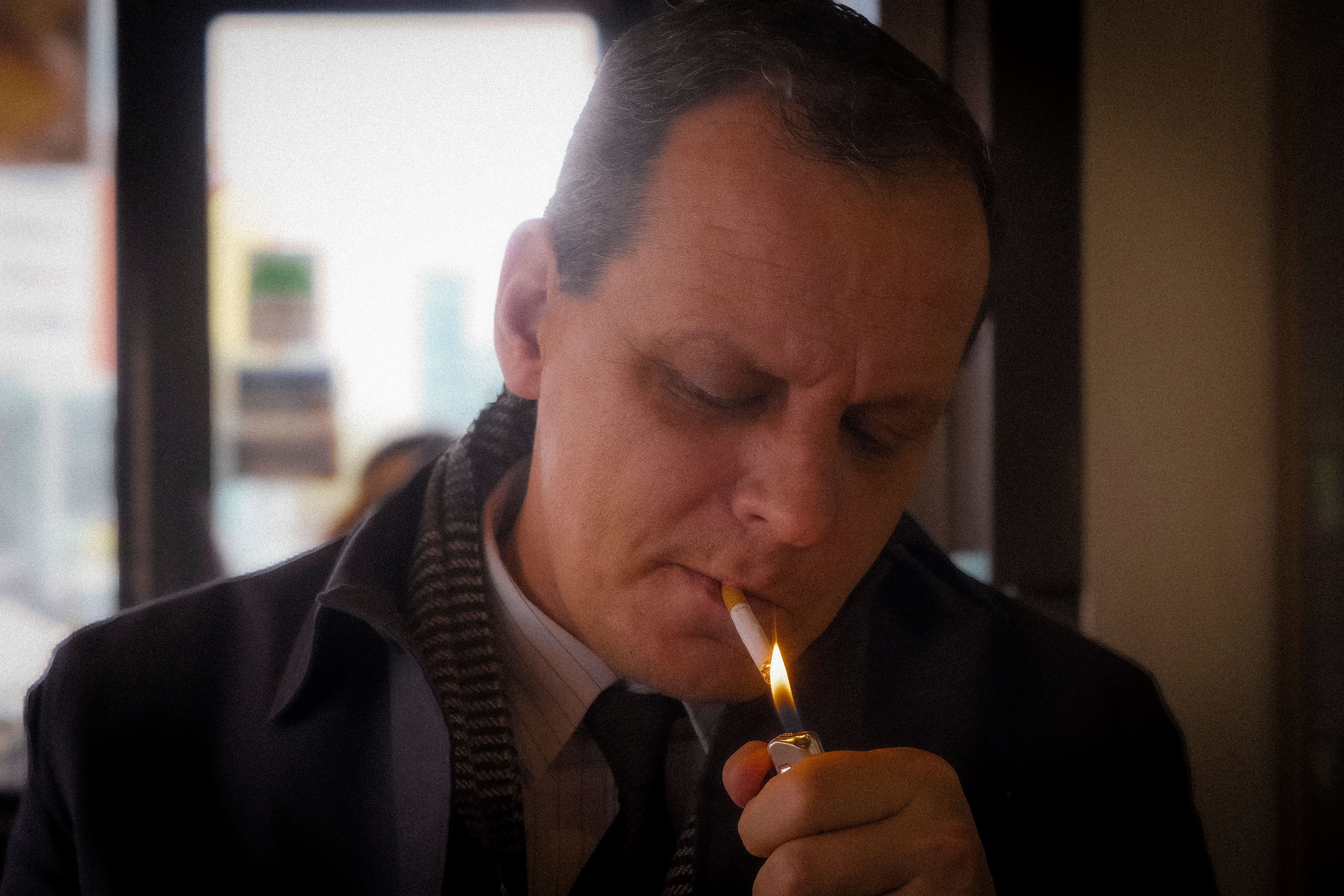 Man Lighting Cigarette · Free Stock Photo
