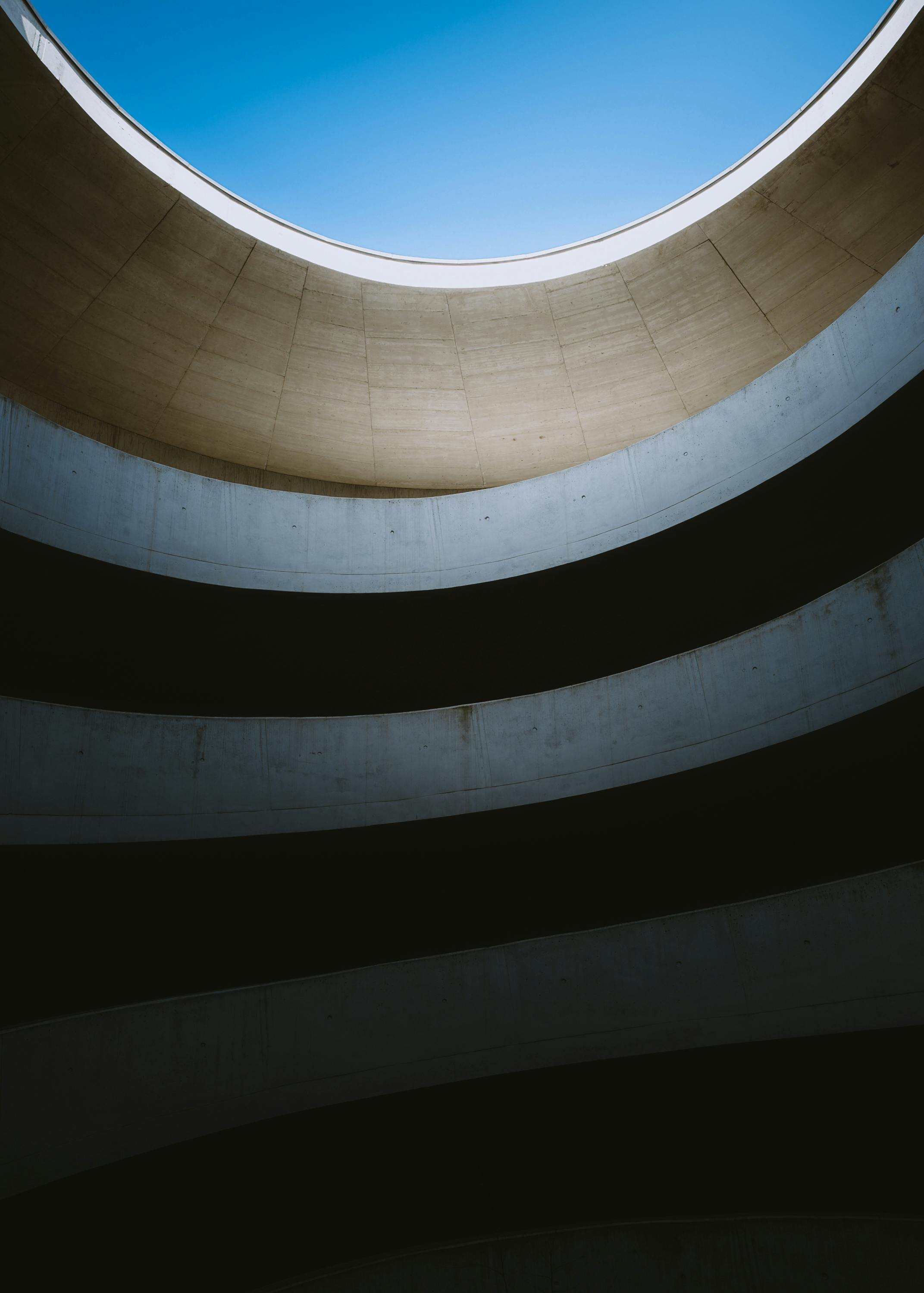 Spiral Concrete Ramps of a Parking Garage · Free Stock Photo