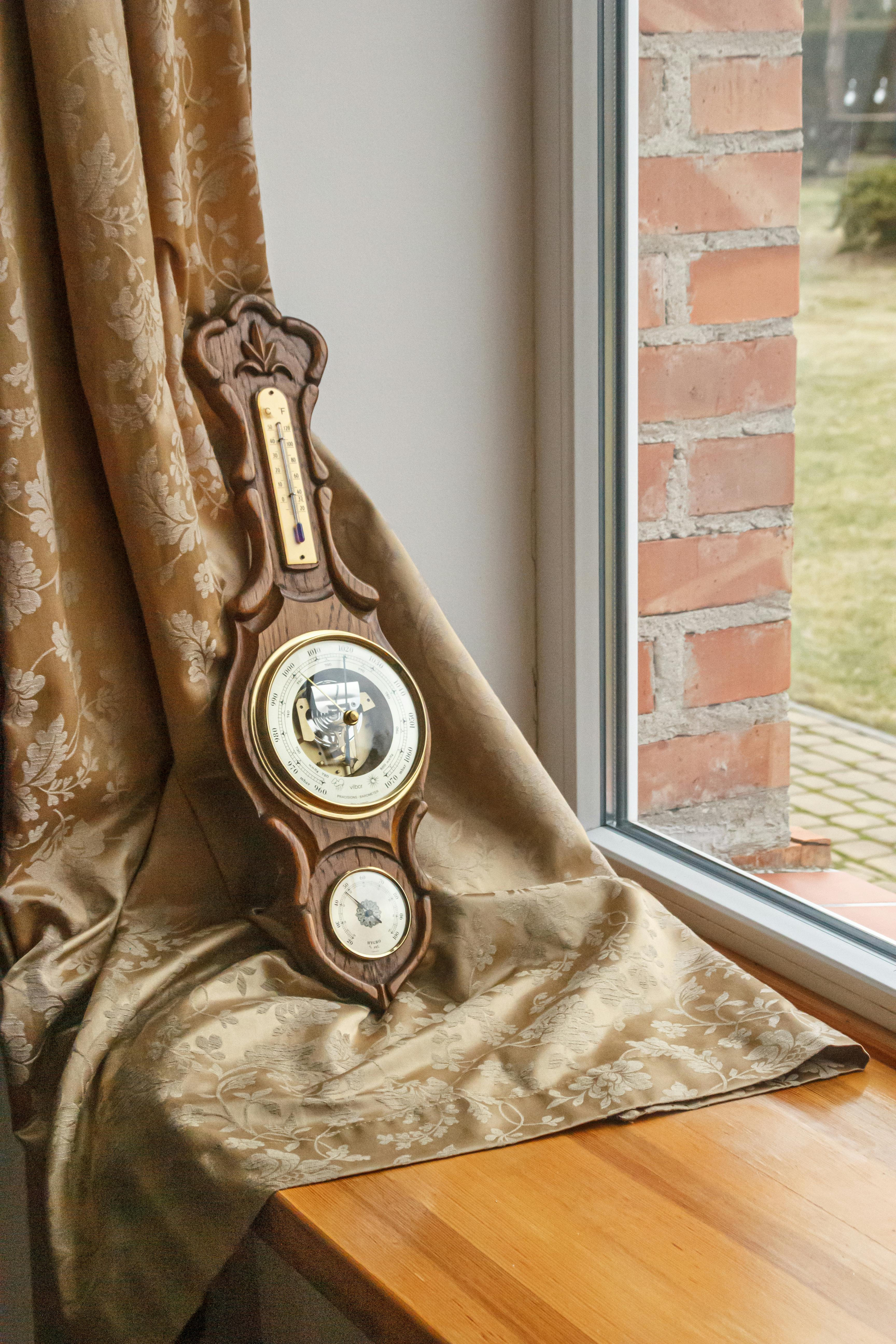 Old-fashioned Barometer on Window Sill · Free Stock Photo