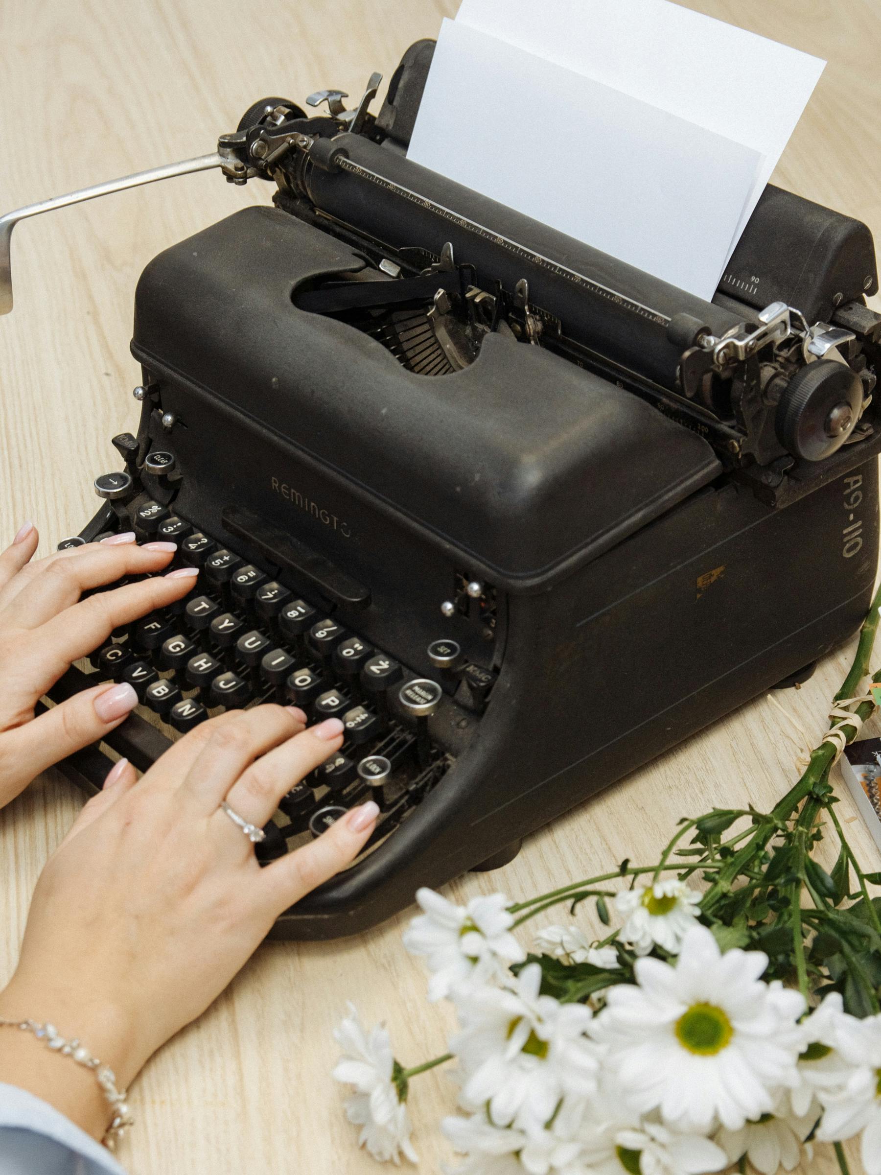 Woman Hands on Typewriter · Free Stock Photo