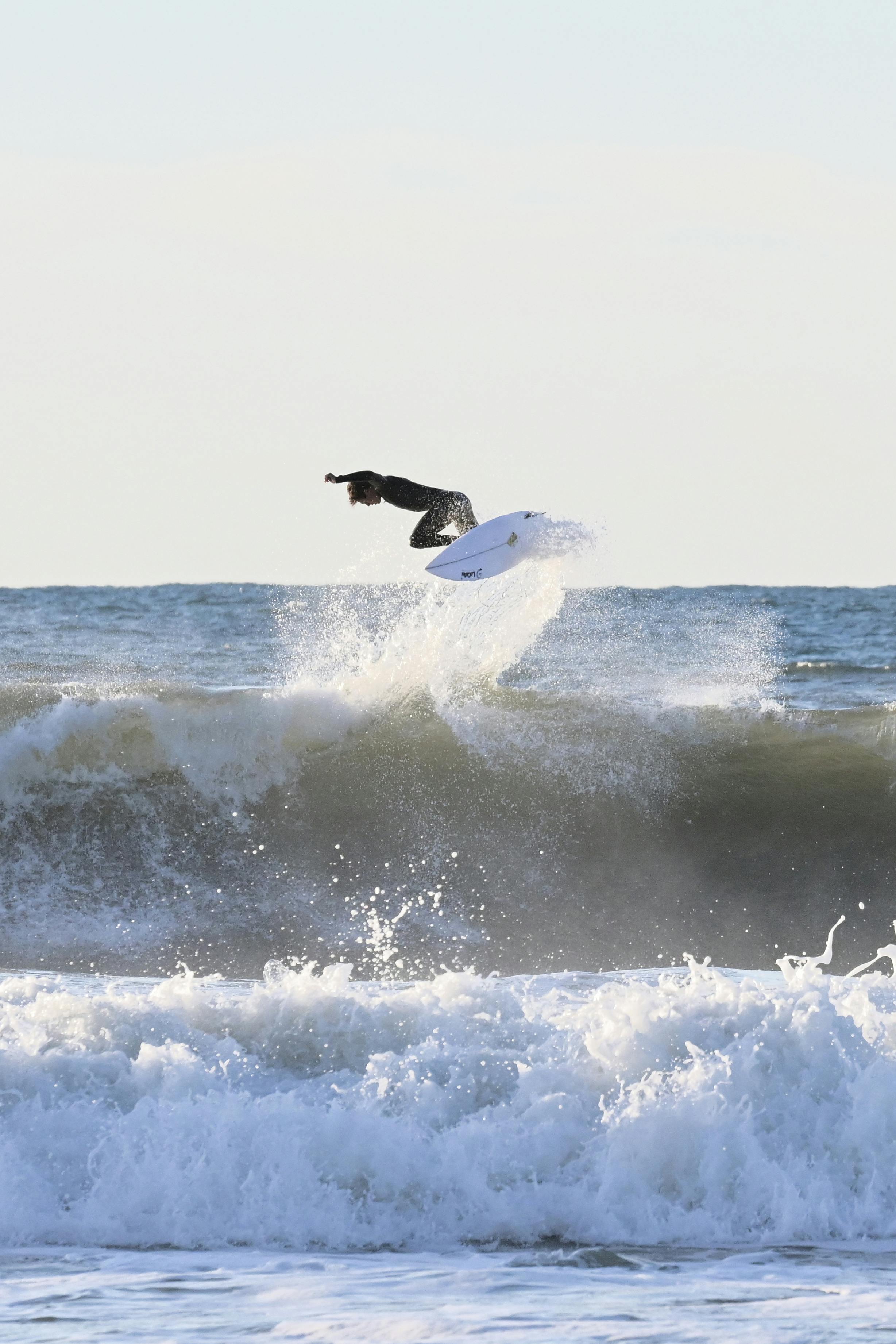 Surfer over Ocean Wave · Free Stock Photo