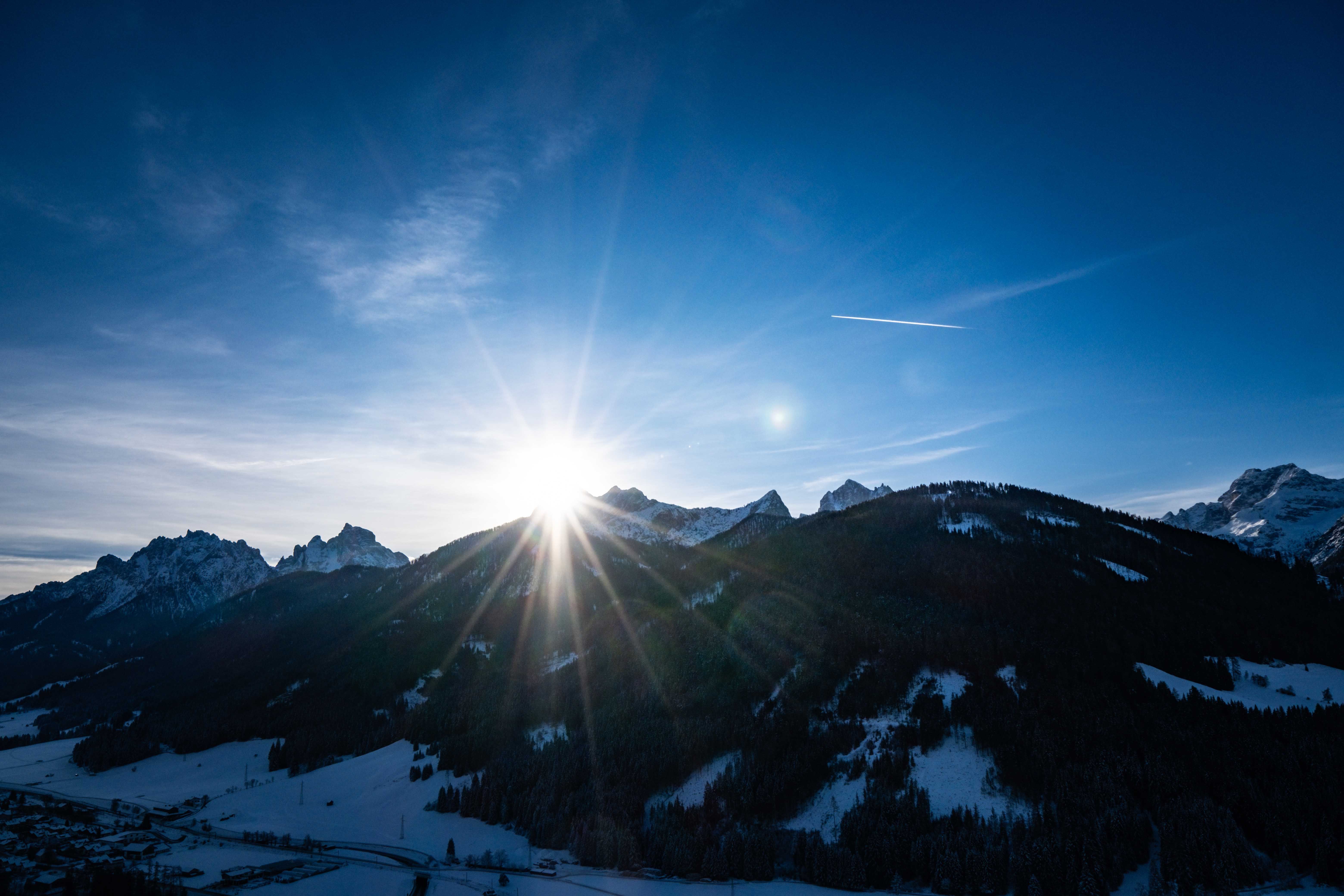 Sunset Sunlight over Hills in Winter · Free Stock Photo