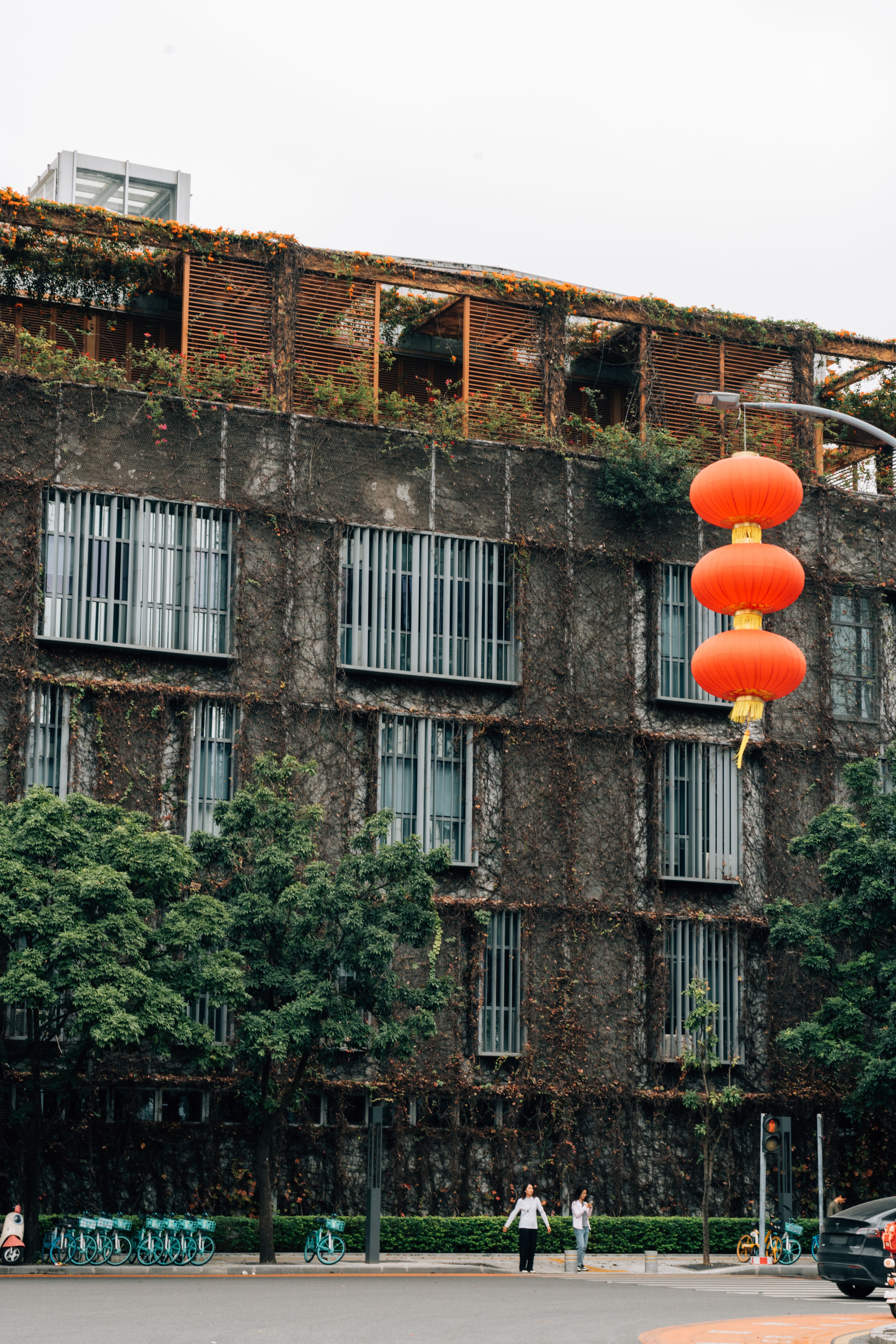 A large building with red and yellow lanterns · Free Stock Photo