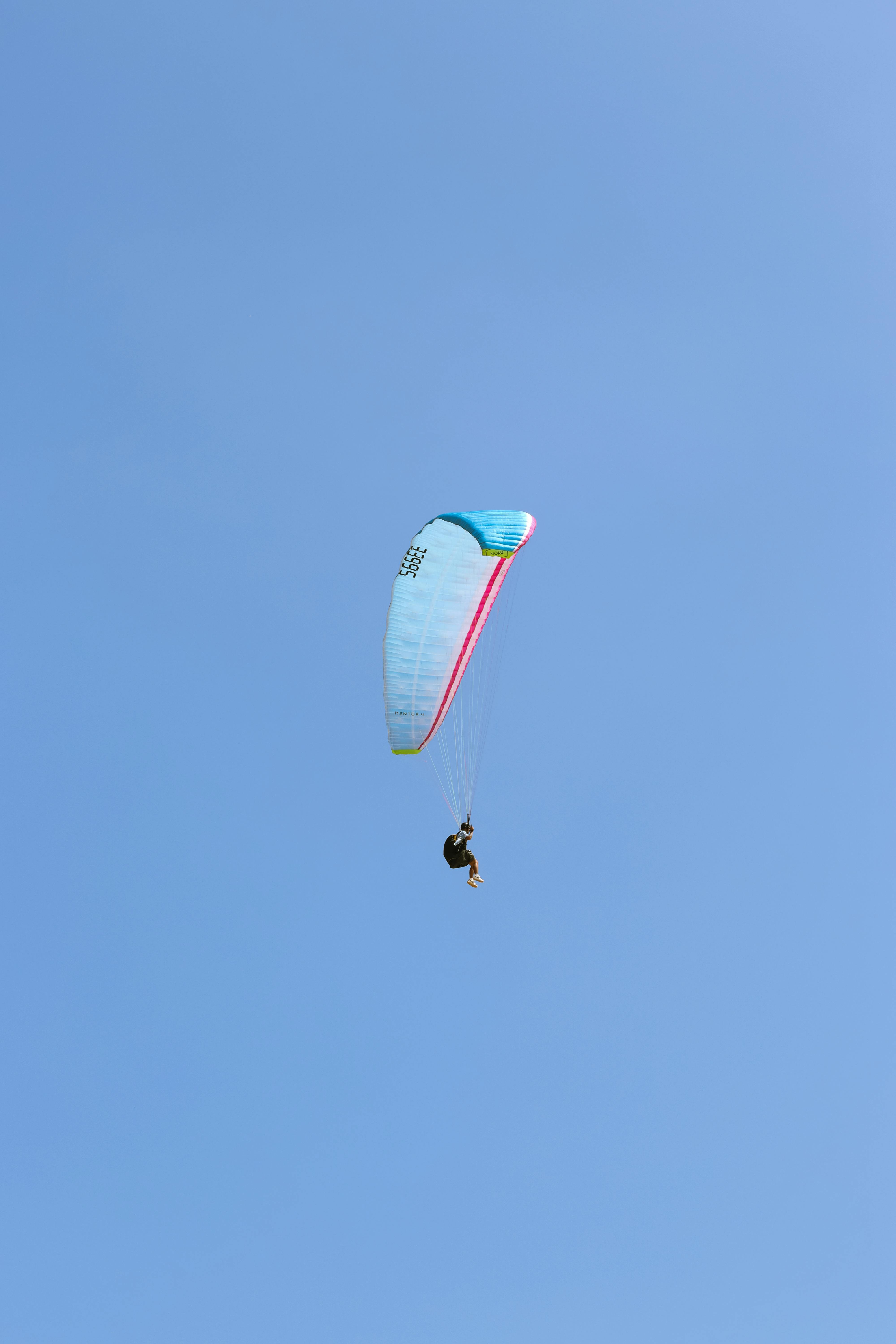 Person Parachuting on Sky · Free Stock Photo