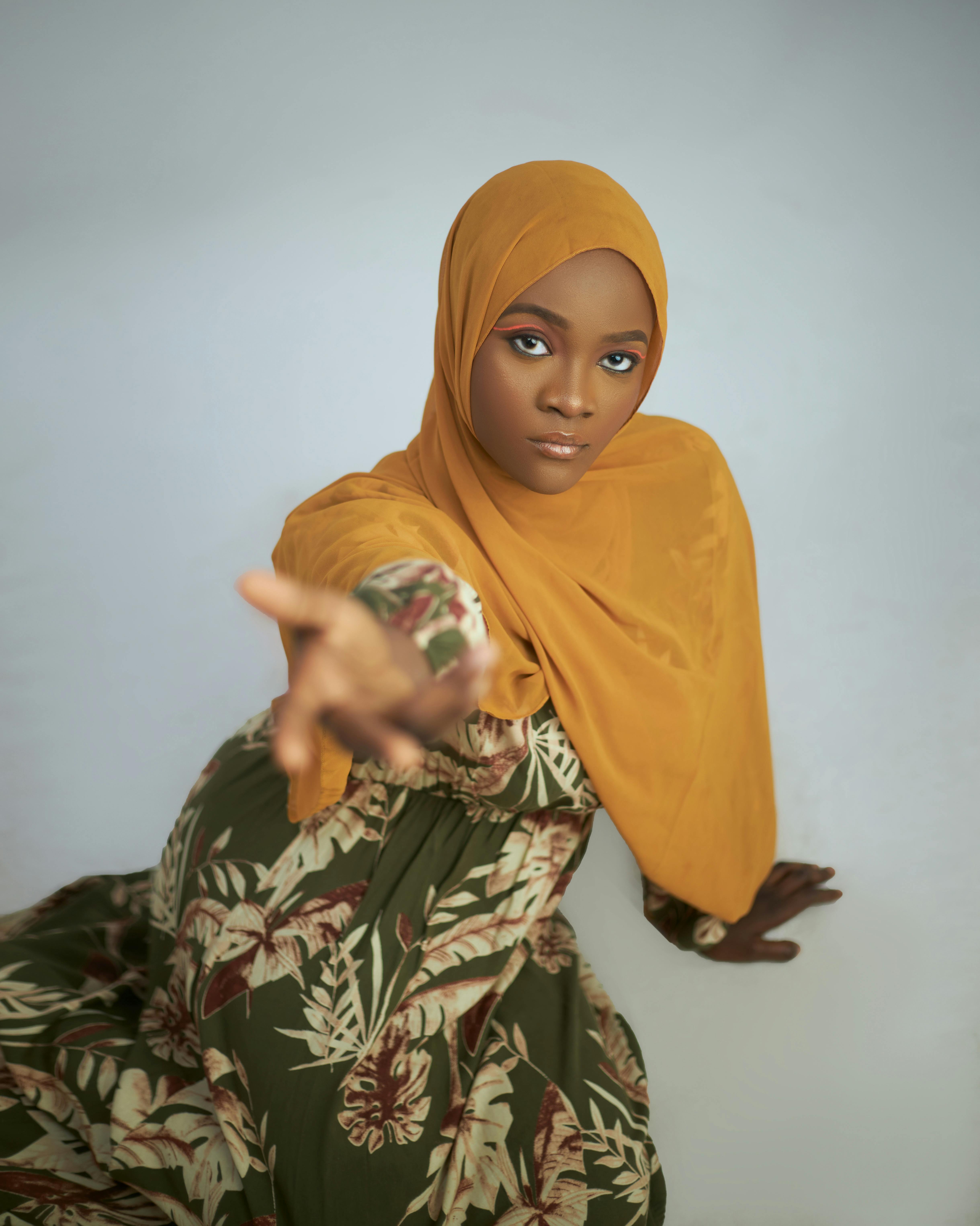 Model Posing in Headscarf and Dress · Free Stock Photo