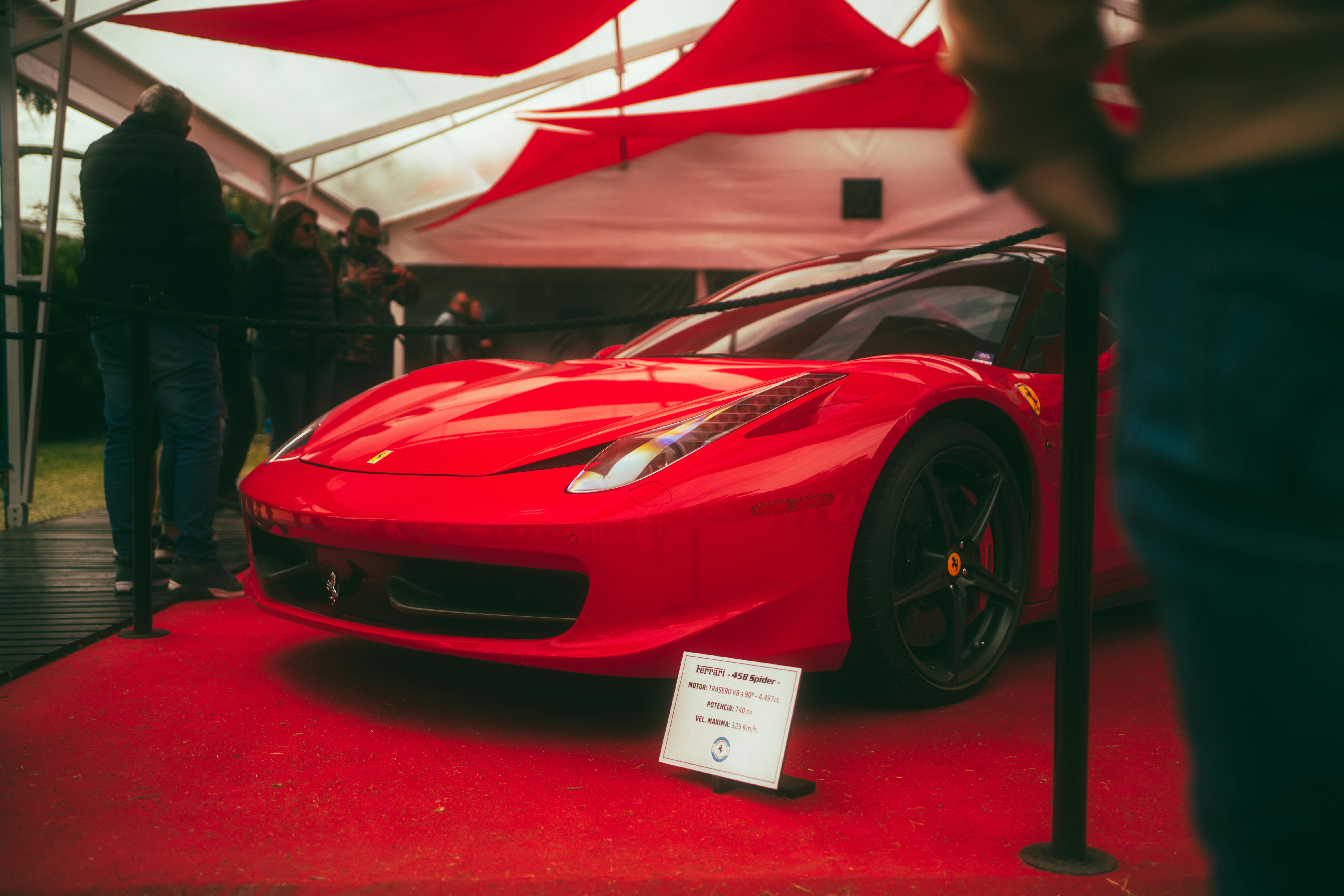 Red Ferrari on a Road · Free Stock Photo