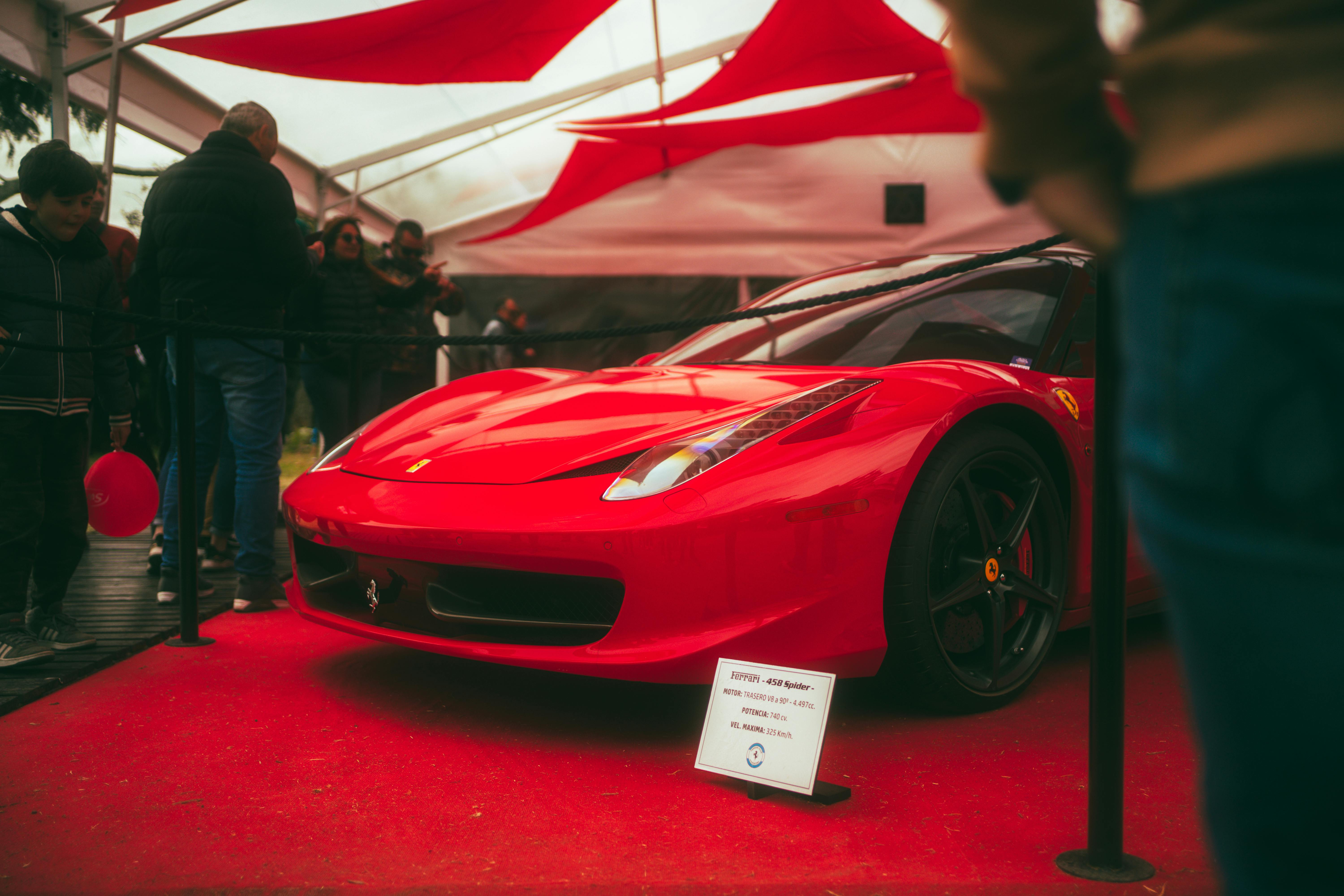 Red Ferrari on a Road · Free Stock Photo
