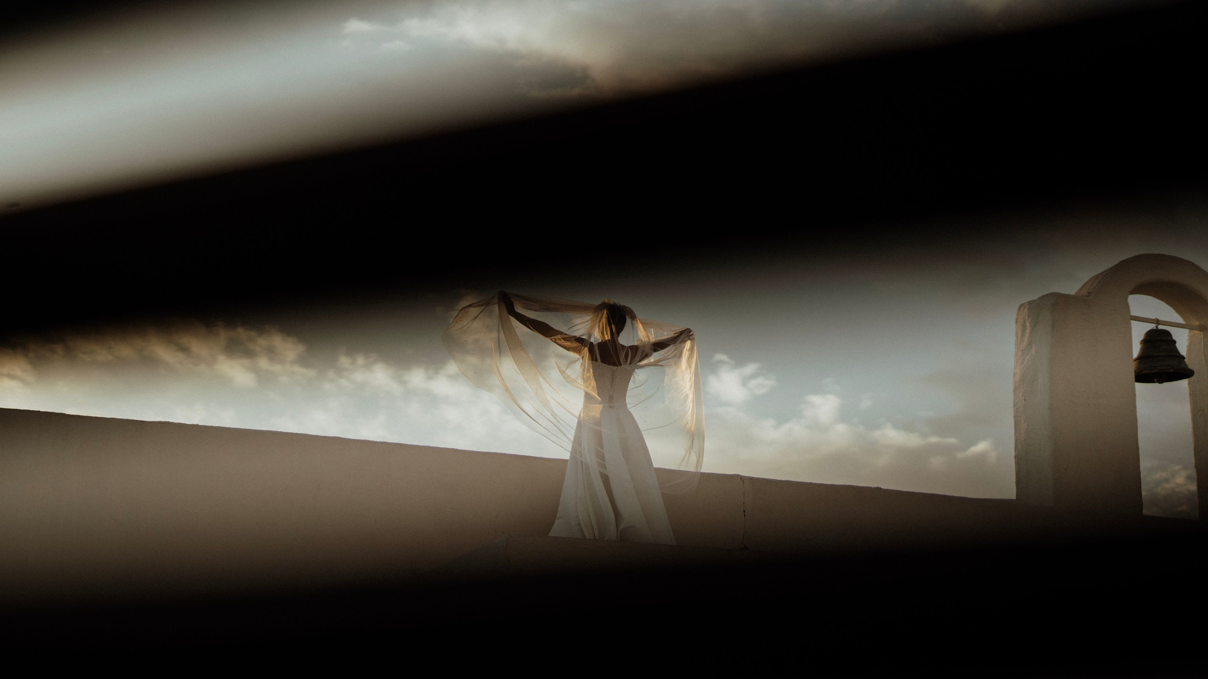 Back View of a Bride Standing on a Rooftop with Her Arms Spread · Free ...