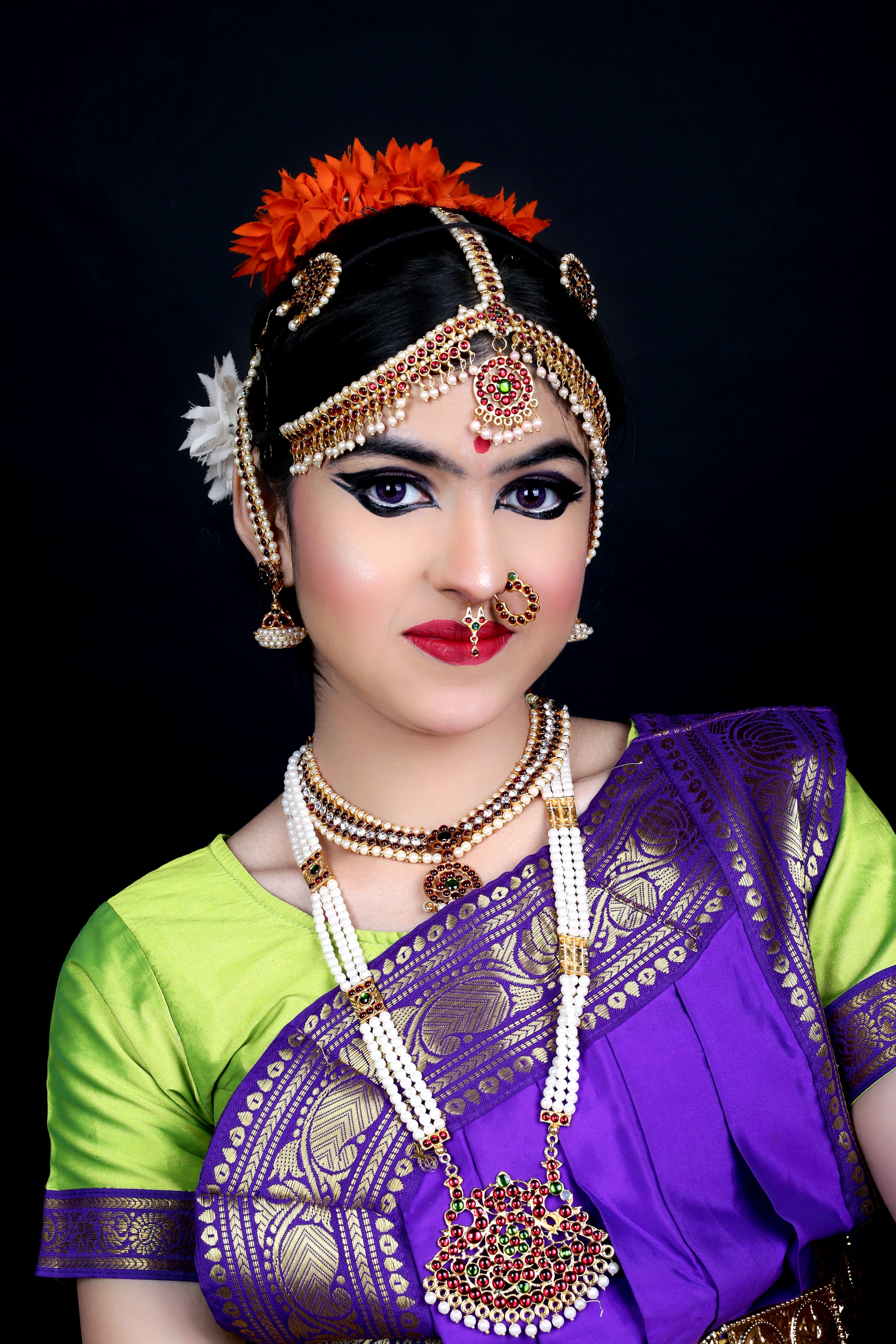 A woman in traditional indian attire posing for a photo · Free Stock Photo