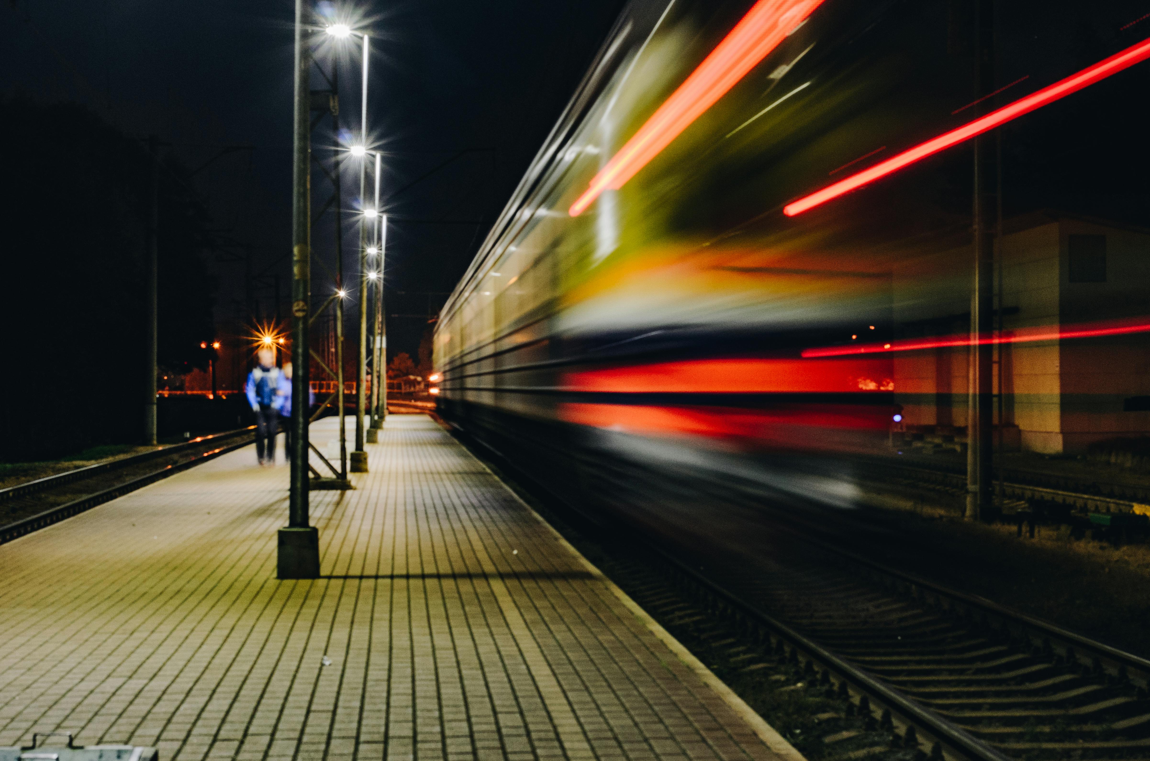 Man Walking on Train Rail · Free Stock Photo