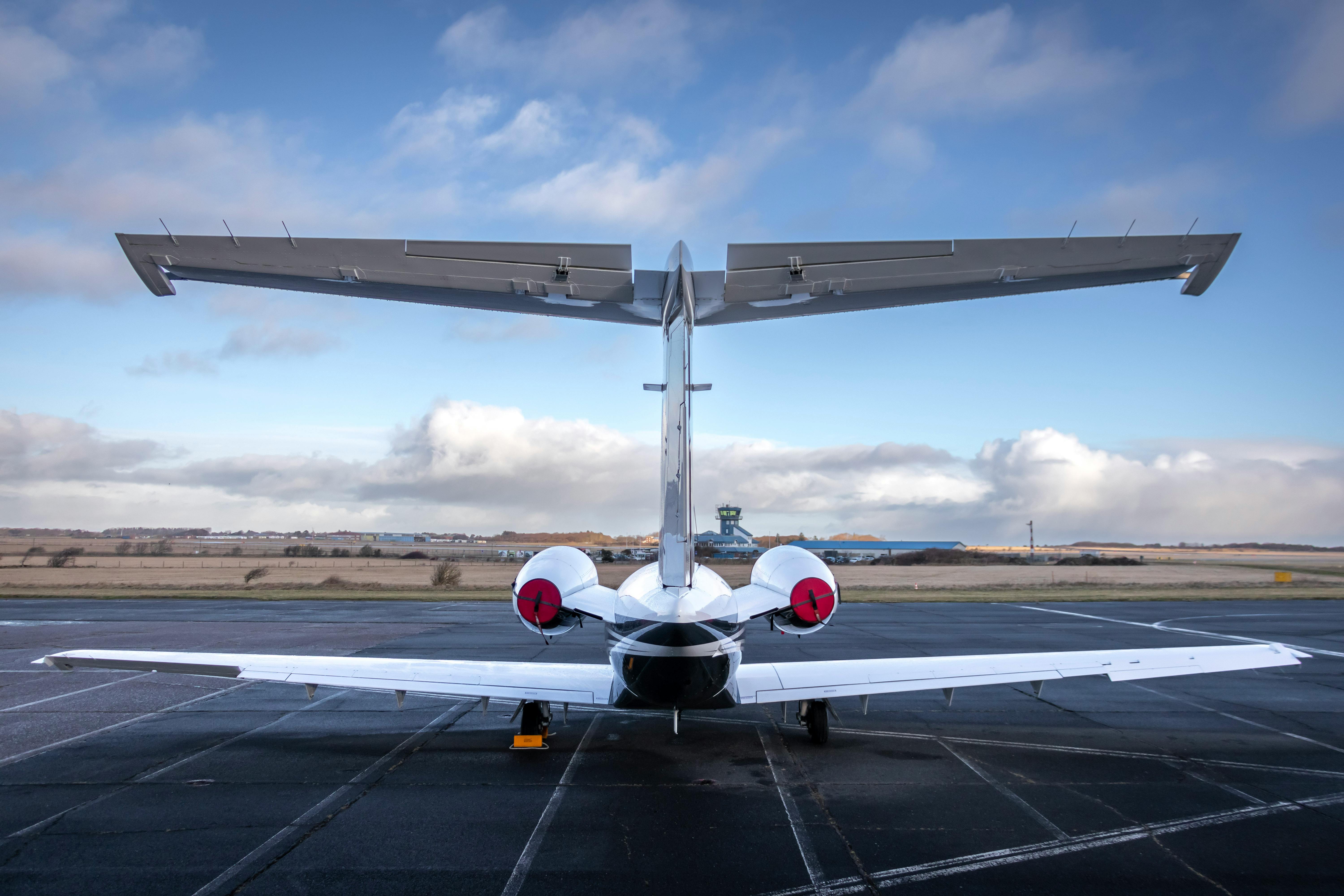 Futuristic Airplane at Airport · Free Stock Photo