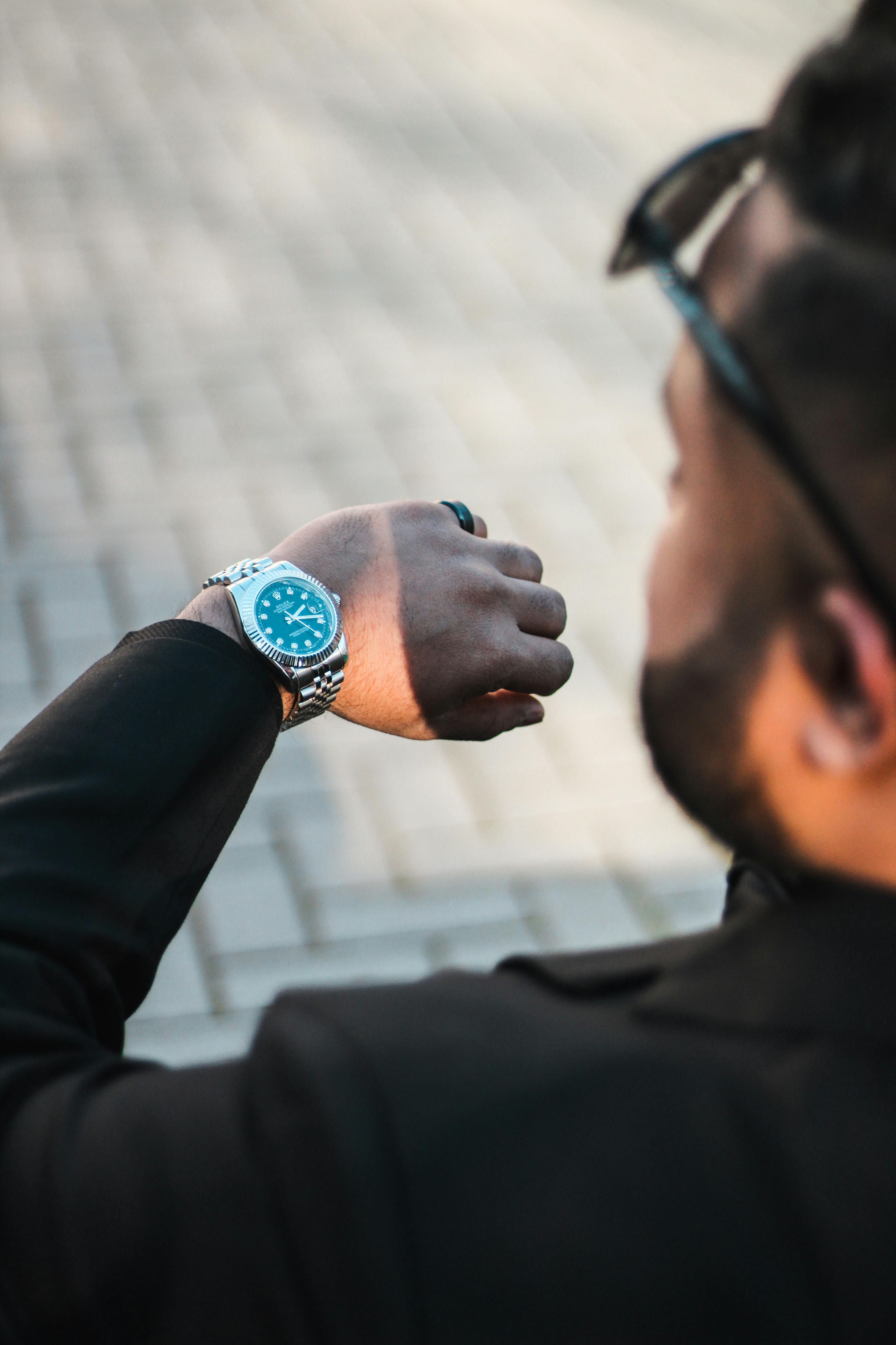 Man Checking His Watch · Free Stock Photo