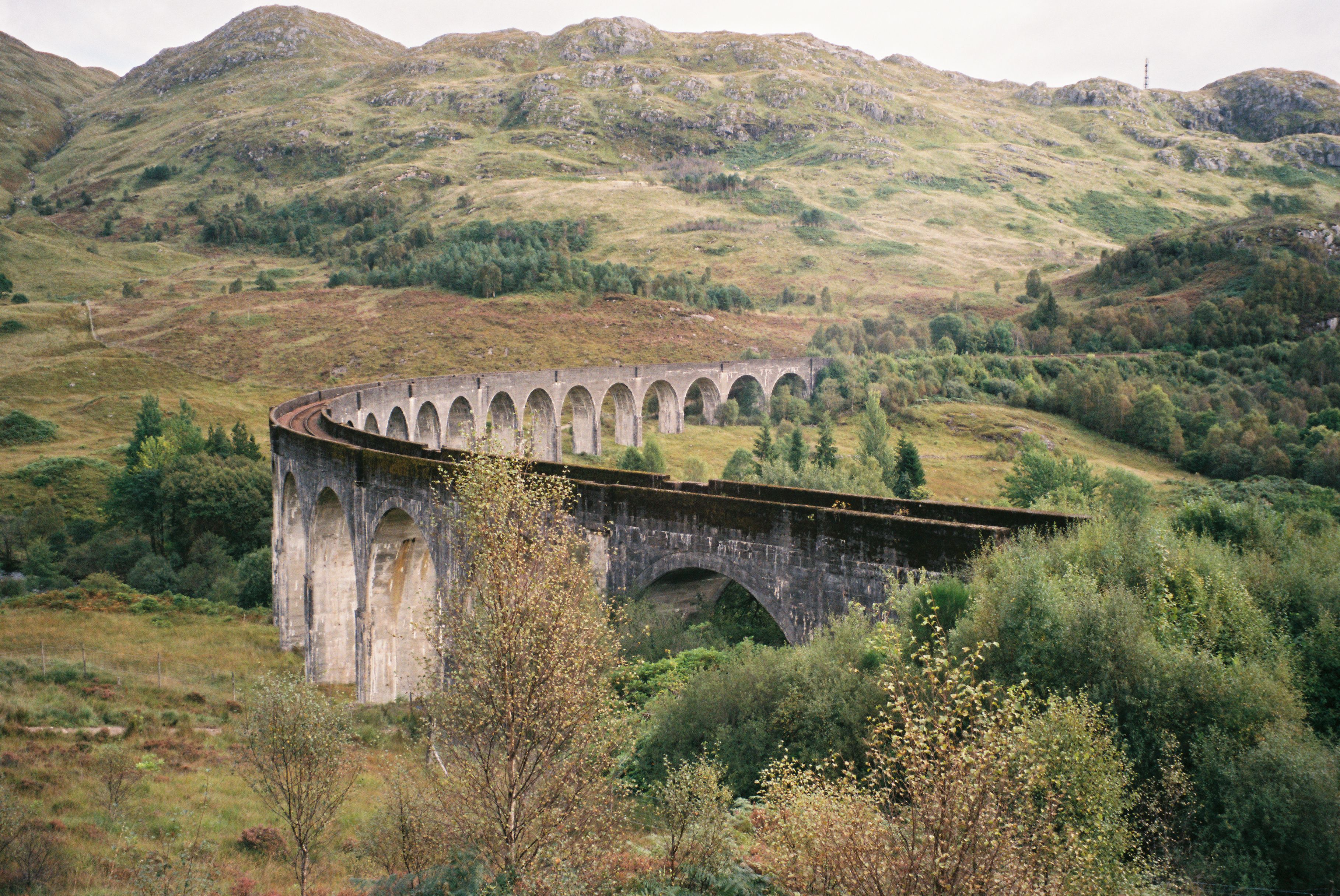 Train Going Through Glenfinnan Viaduct in Scotland · Free Stock Photo