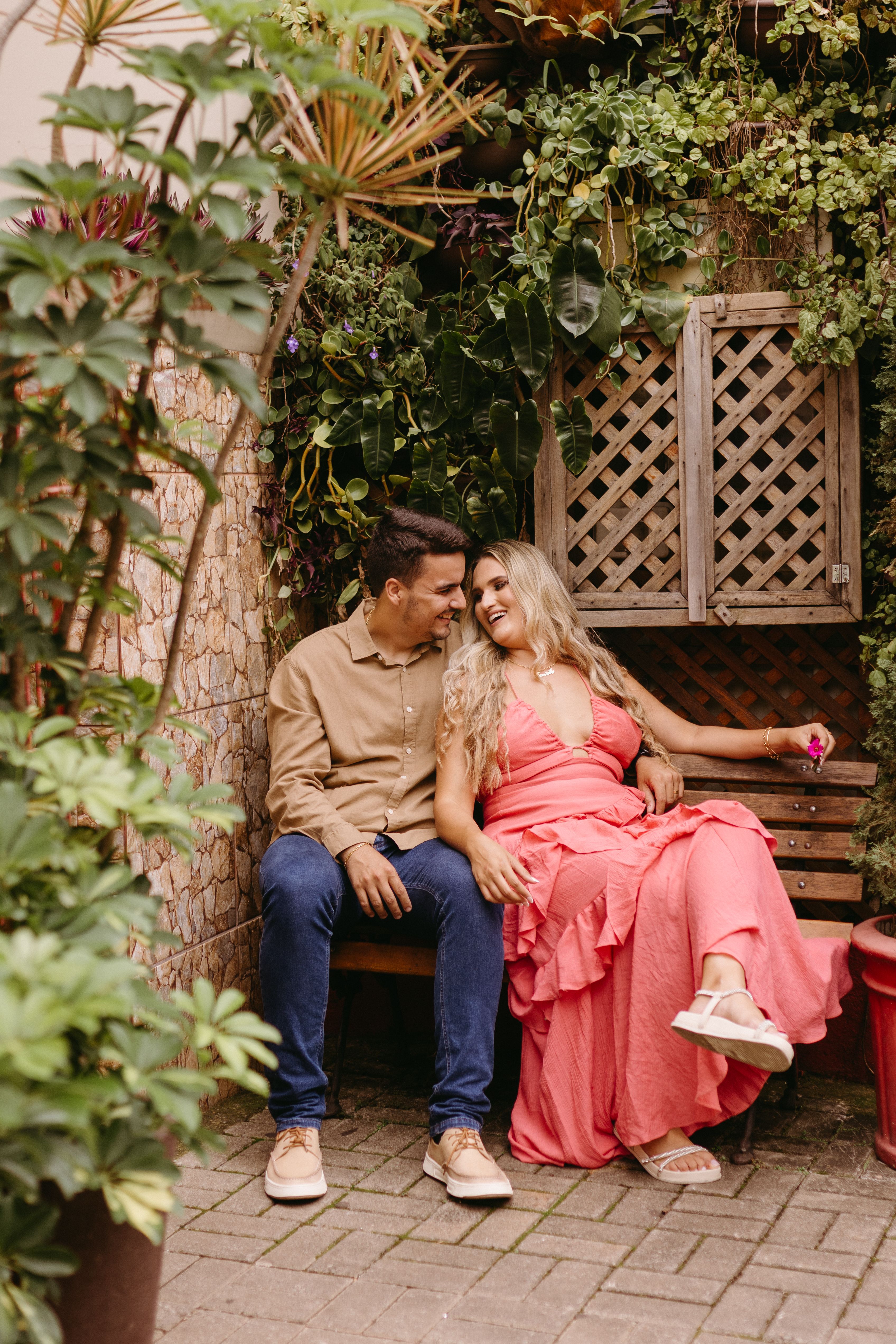 Couple Smiling and Sitting Together on Bench · Free Stock Photo