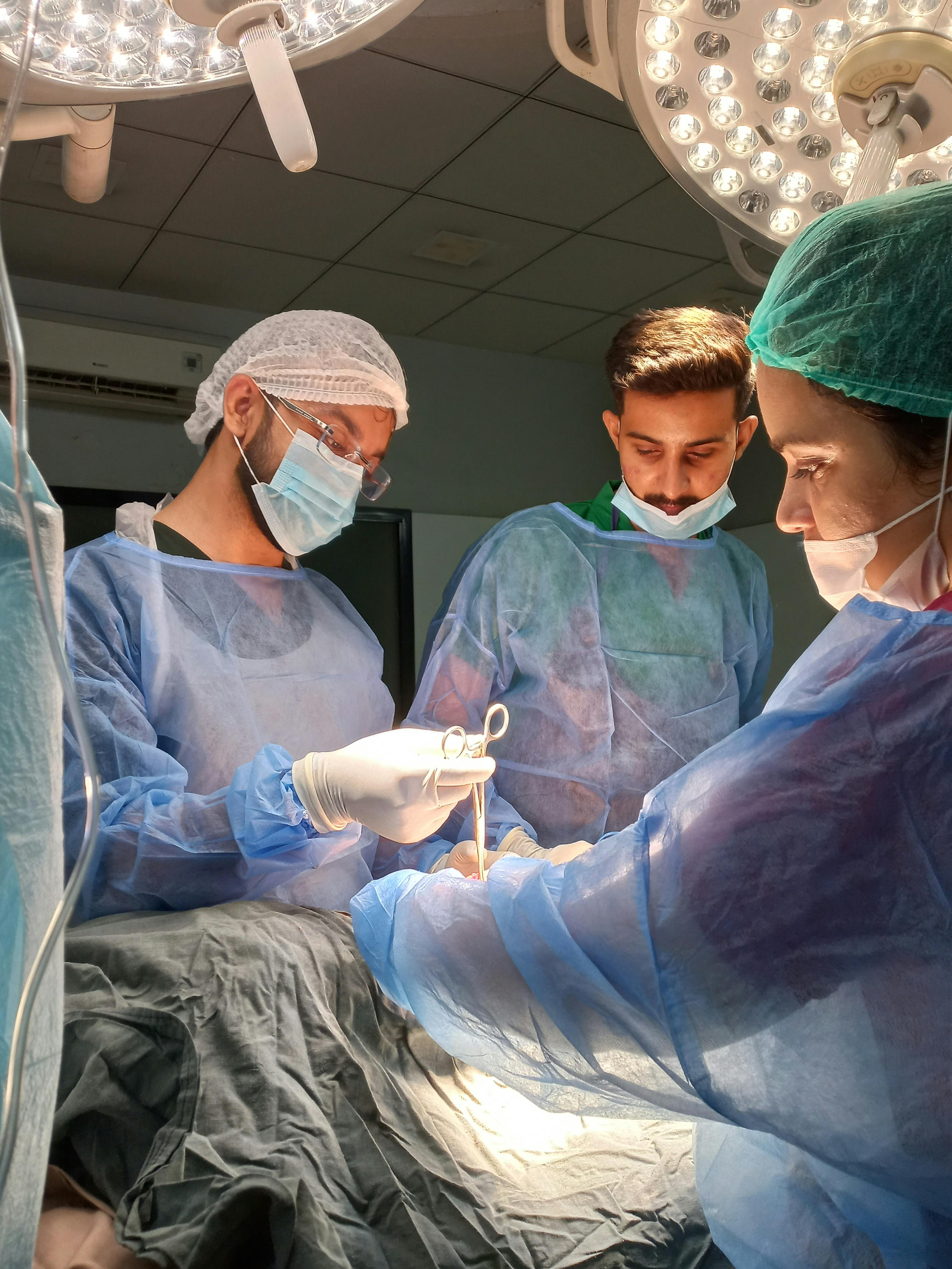Group of Doctors Doing Operation Inside Room · Free Stock Photo
