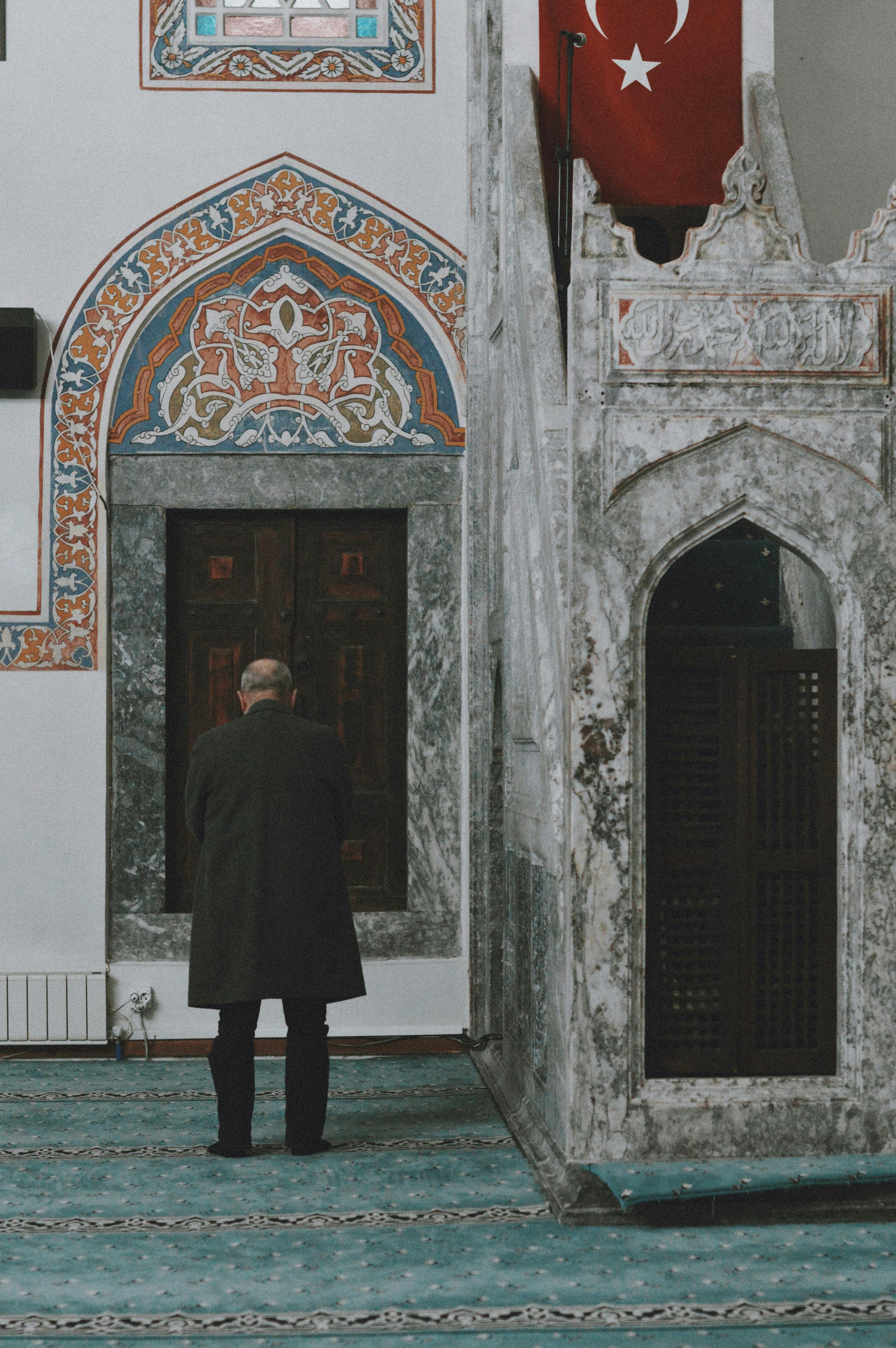 Man Praying at Mosque in Darkness · Free Stock Photo