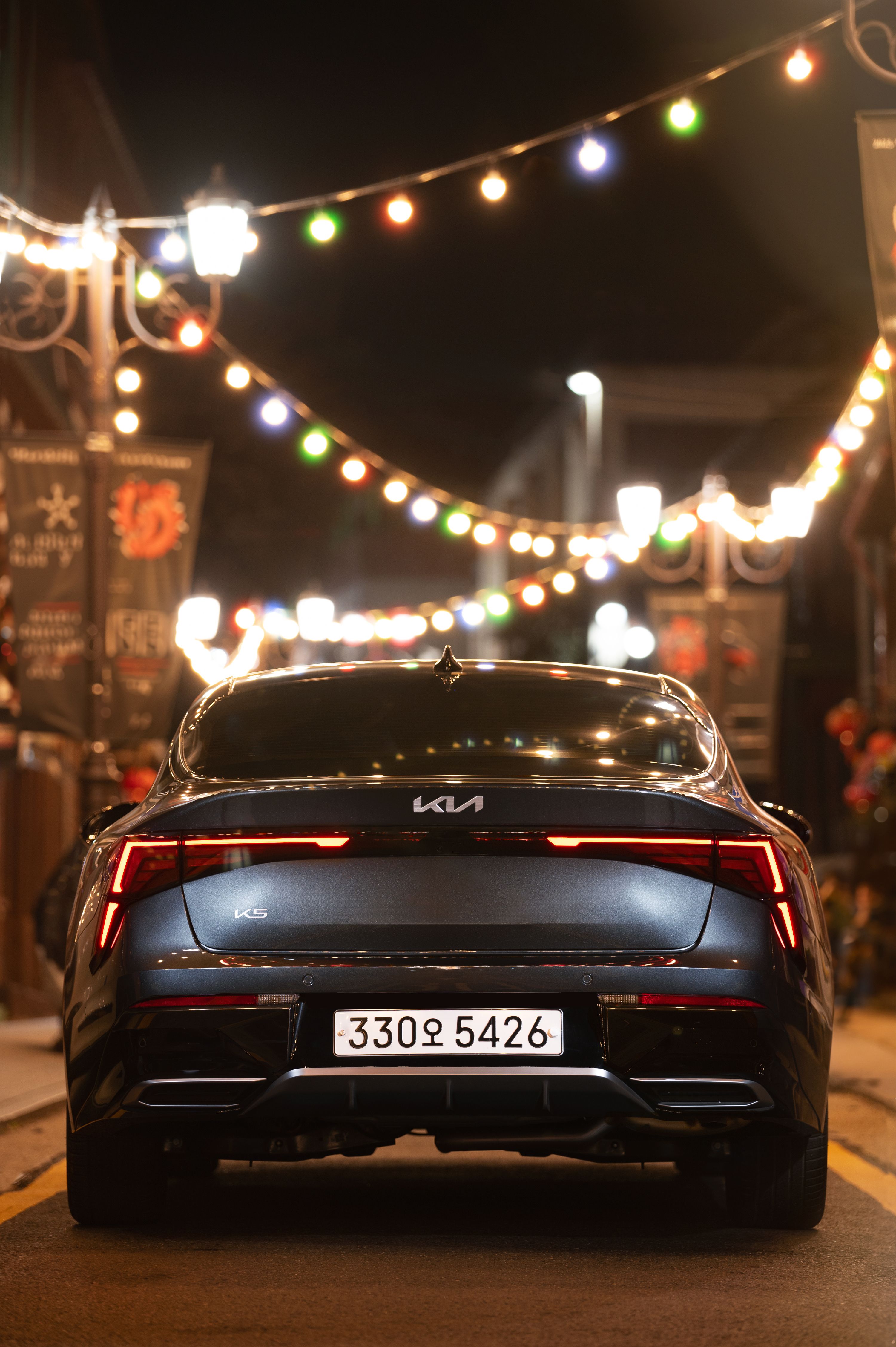 Back View of Kia K5 at Night · Free Stock Photo
