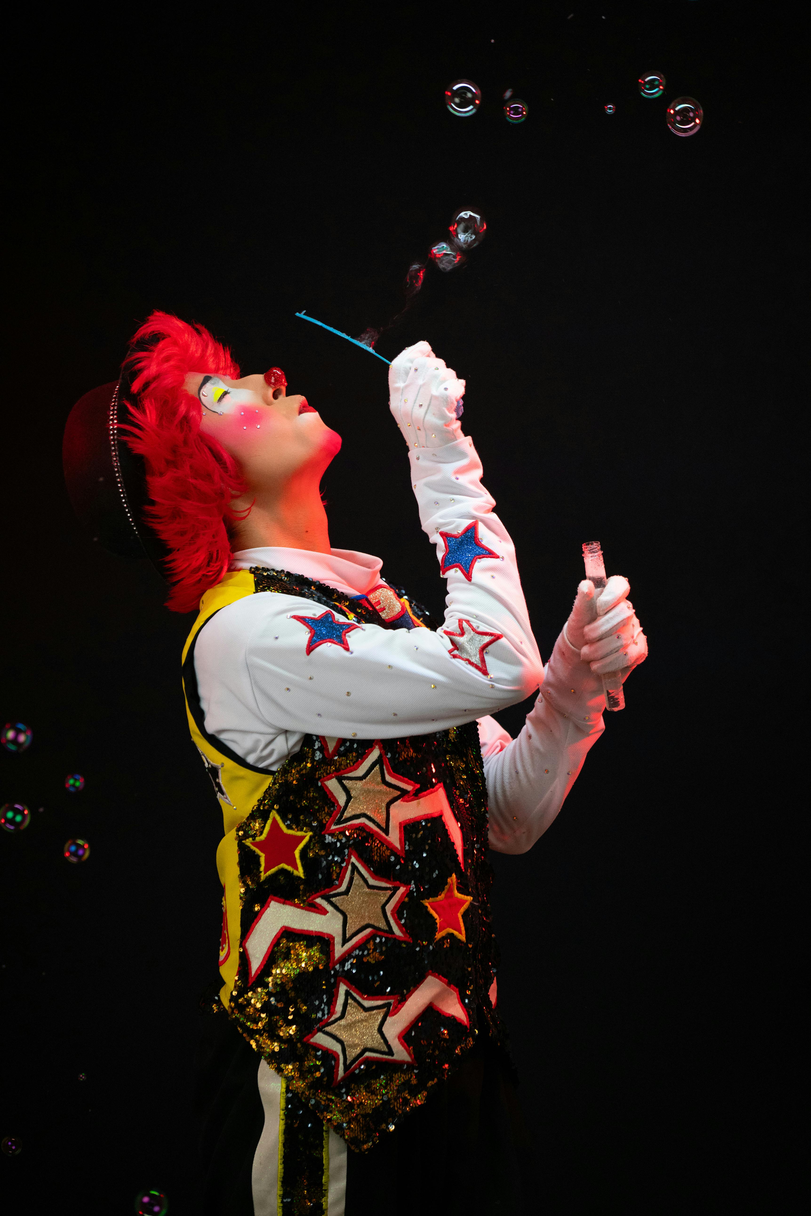 Clown Blows Soap Bubbles · Free Stock Photo