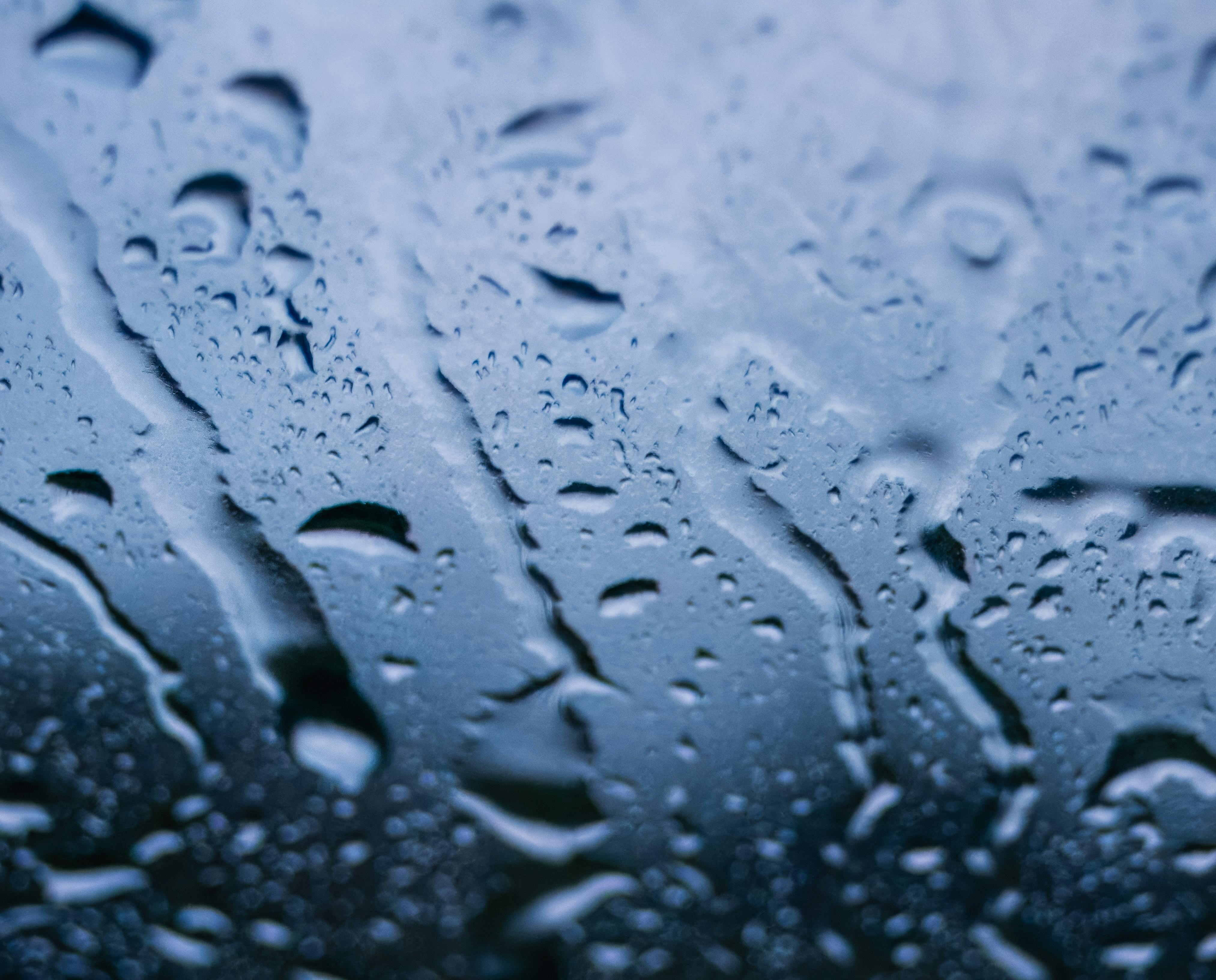 Abstract background with raindrops on misted glass · Free Stock Photo