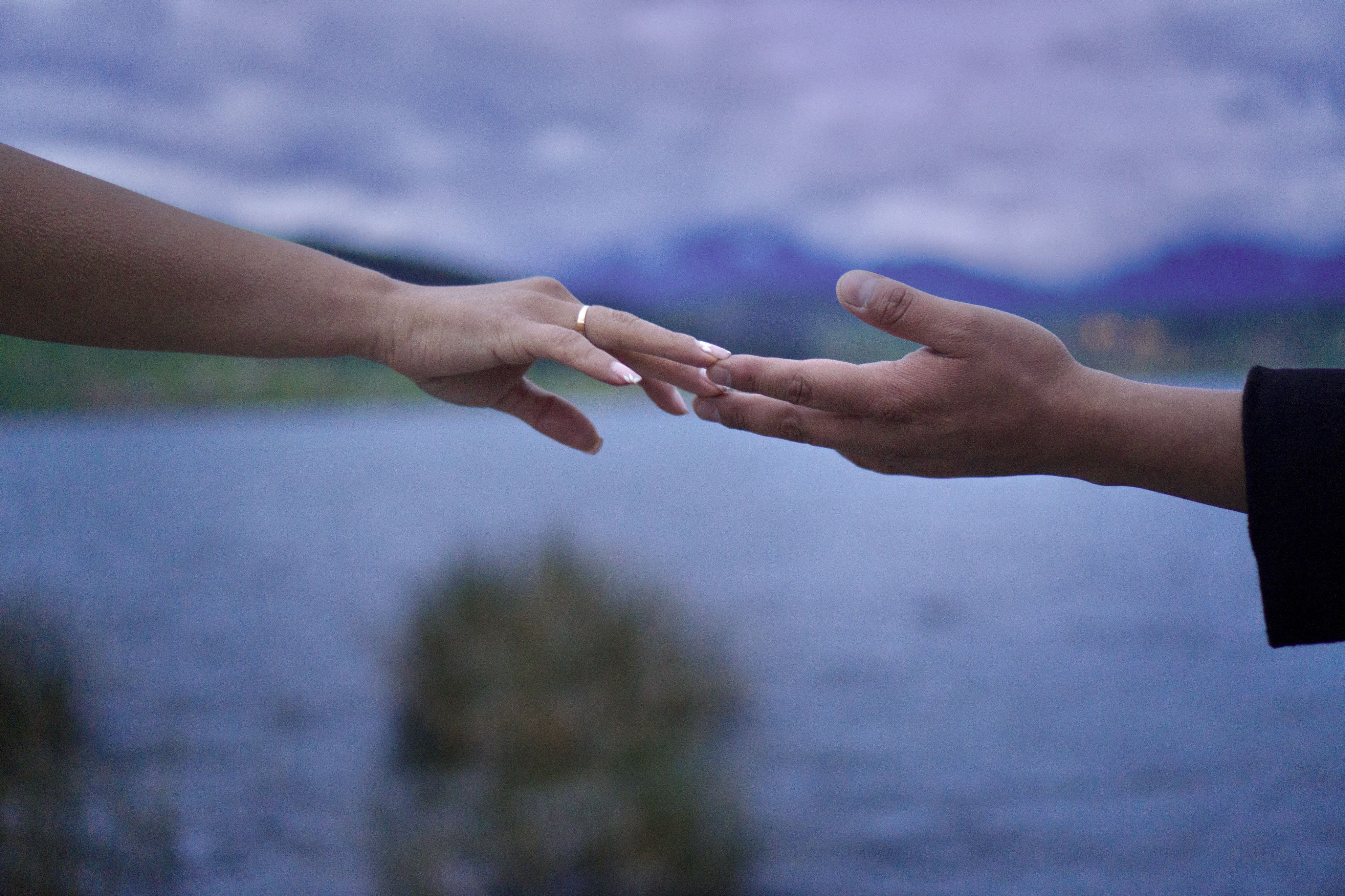Hands of Couple Touching · Free Stock Photo
