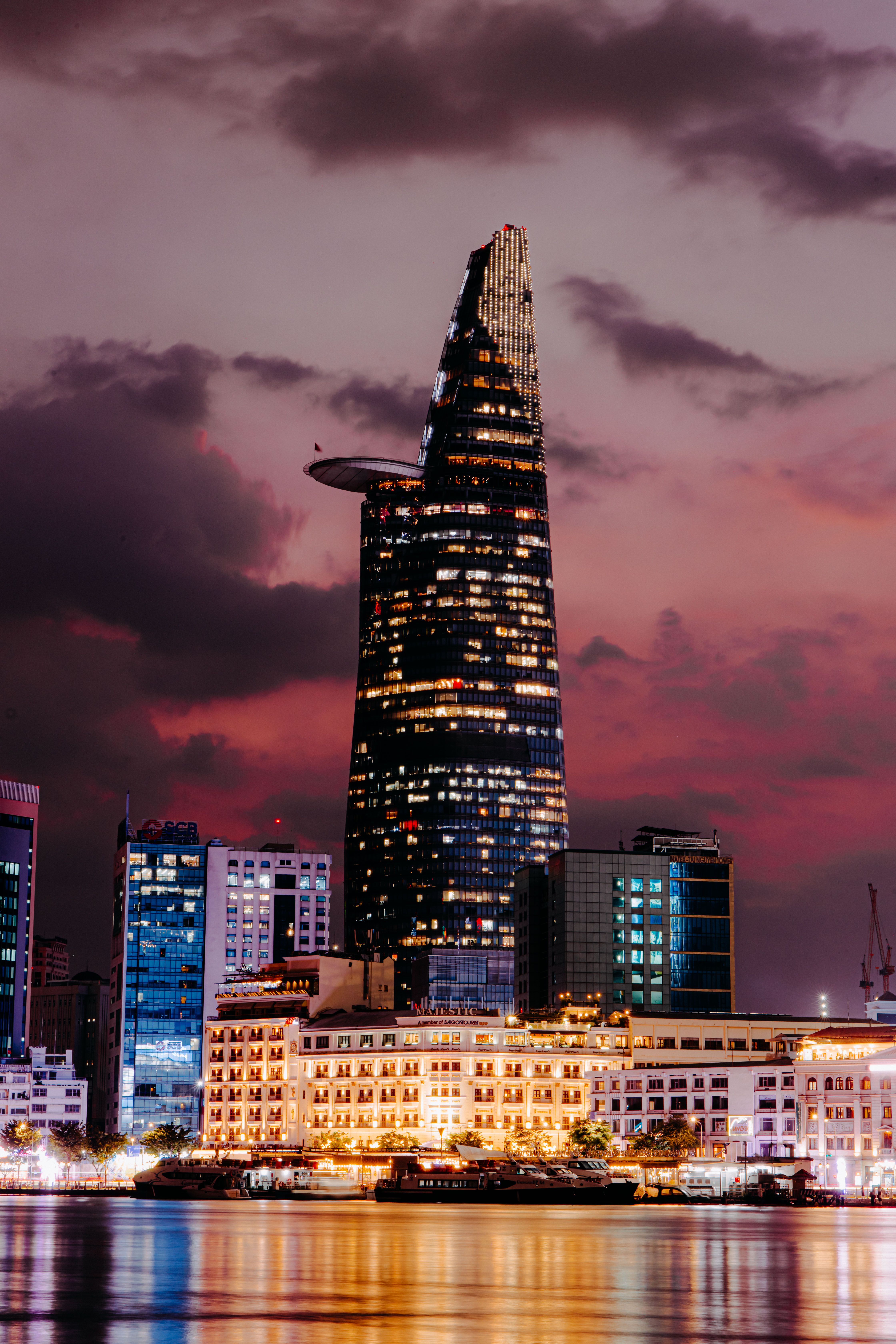 Illuminated Bitexco Financial Tower and Skyscrapers in Ho Chi Minh ...
