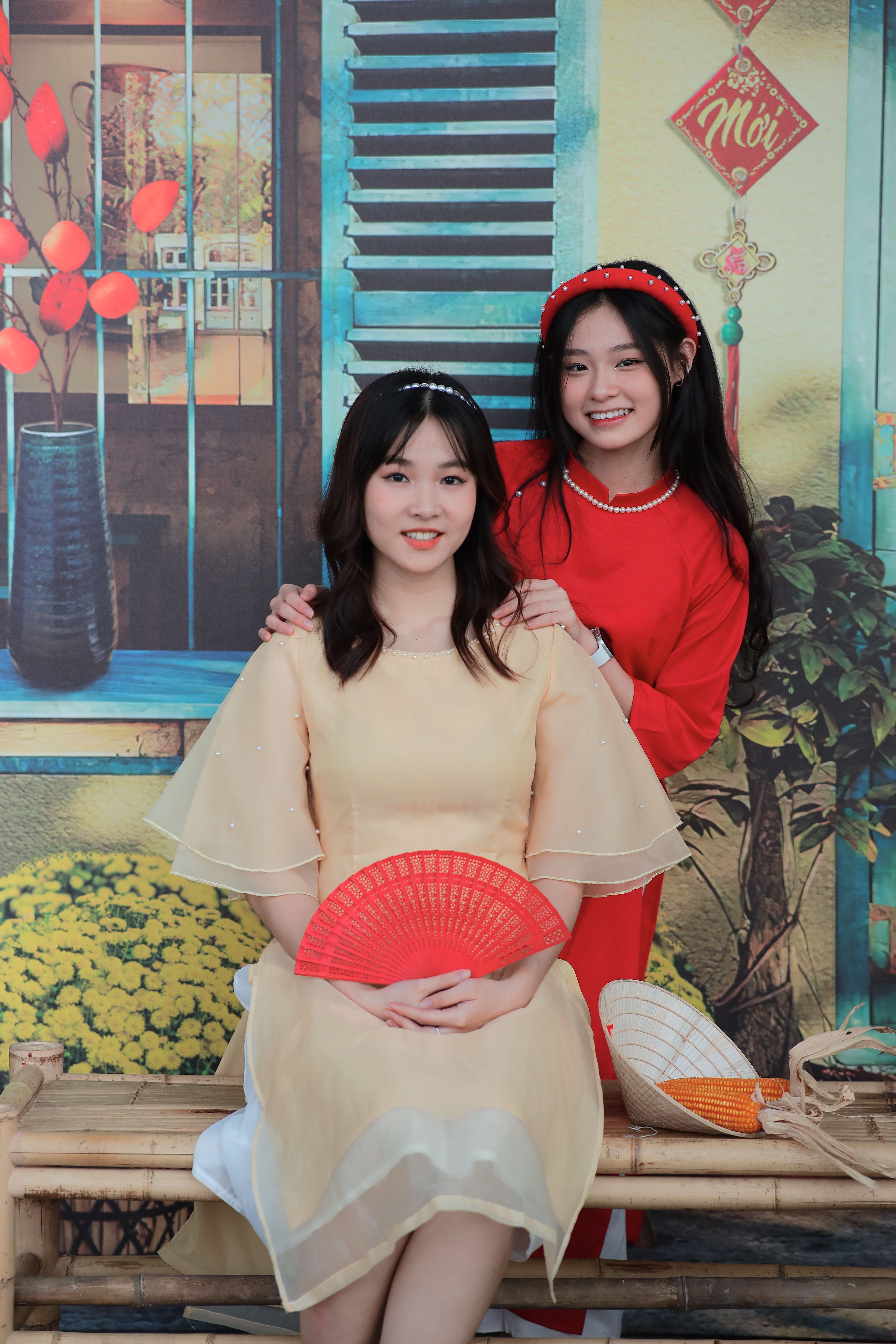 Young Models in Vietnamese Ao Dai Dresses · Free Stock Photo