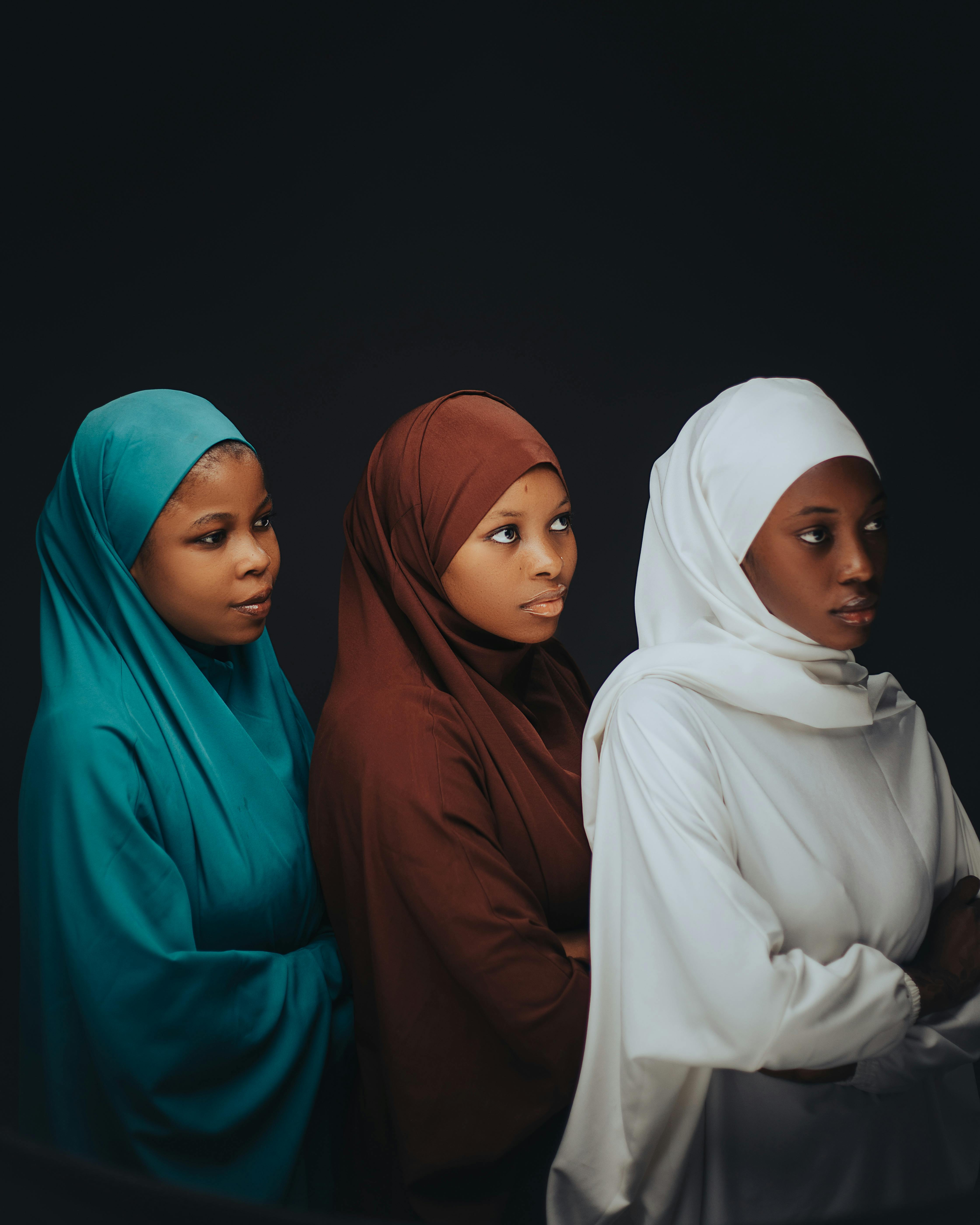 Studio Shot of Three Young Women in Hijabs · Free Stock Photo