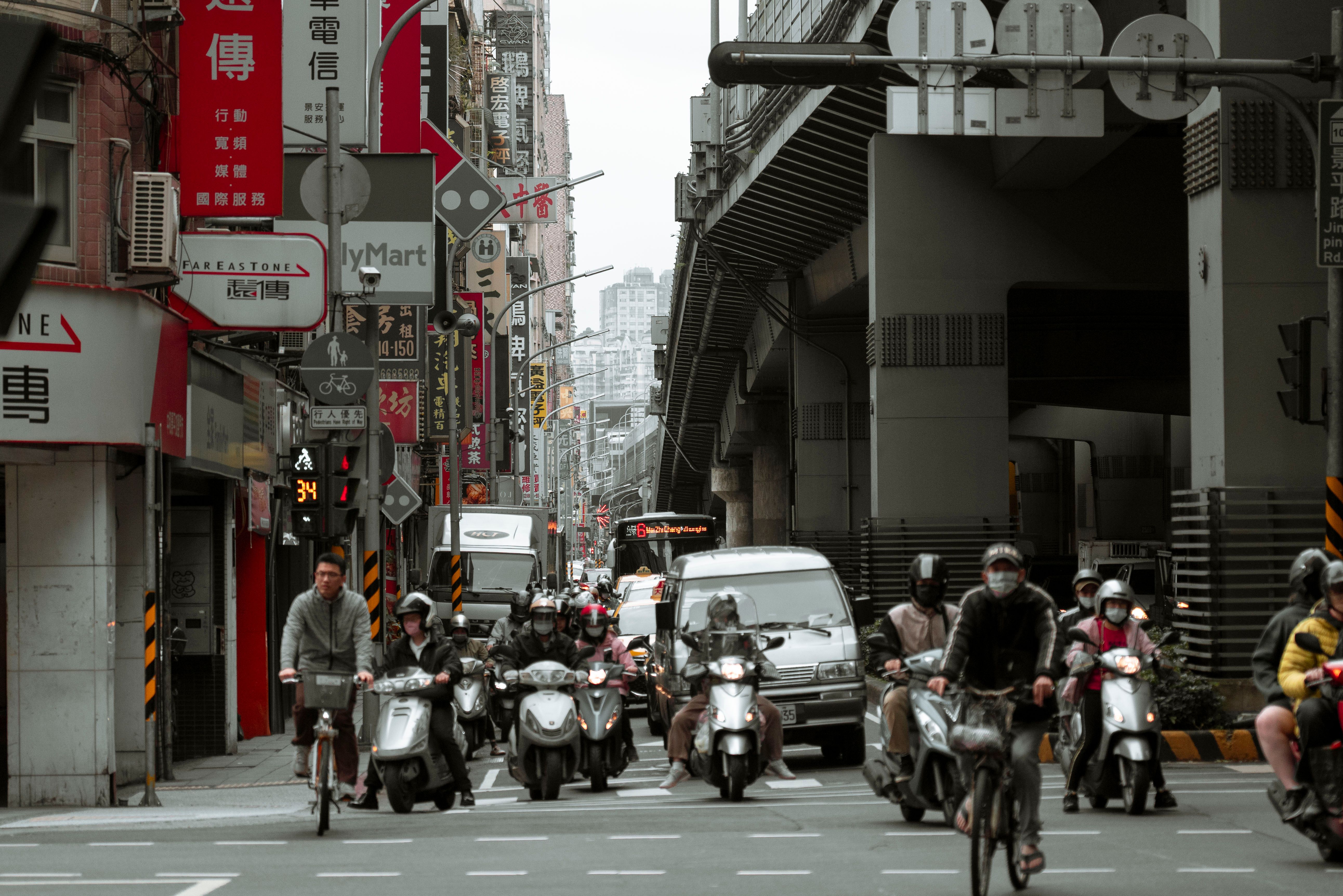 People on Motor Scooters on Street · Free Stock Photo