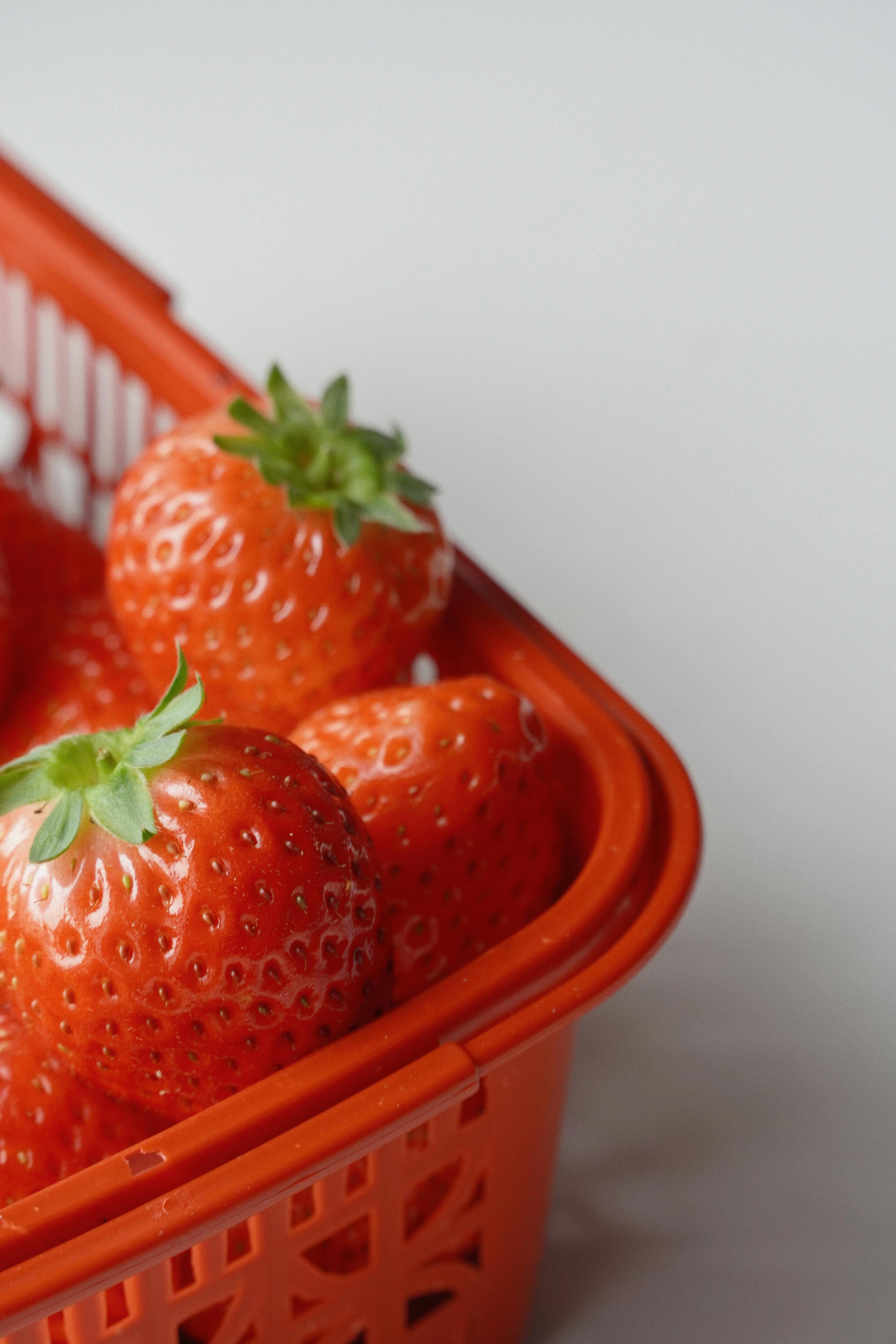 Strawberry Fruit on Brown Wooden Surface · Free Stock Photo