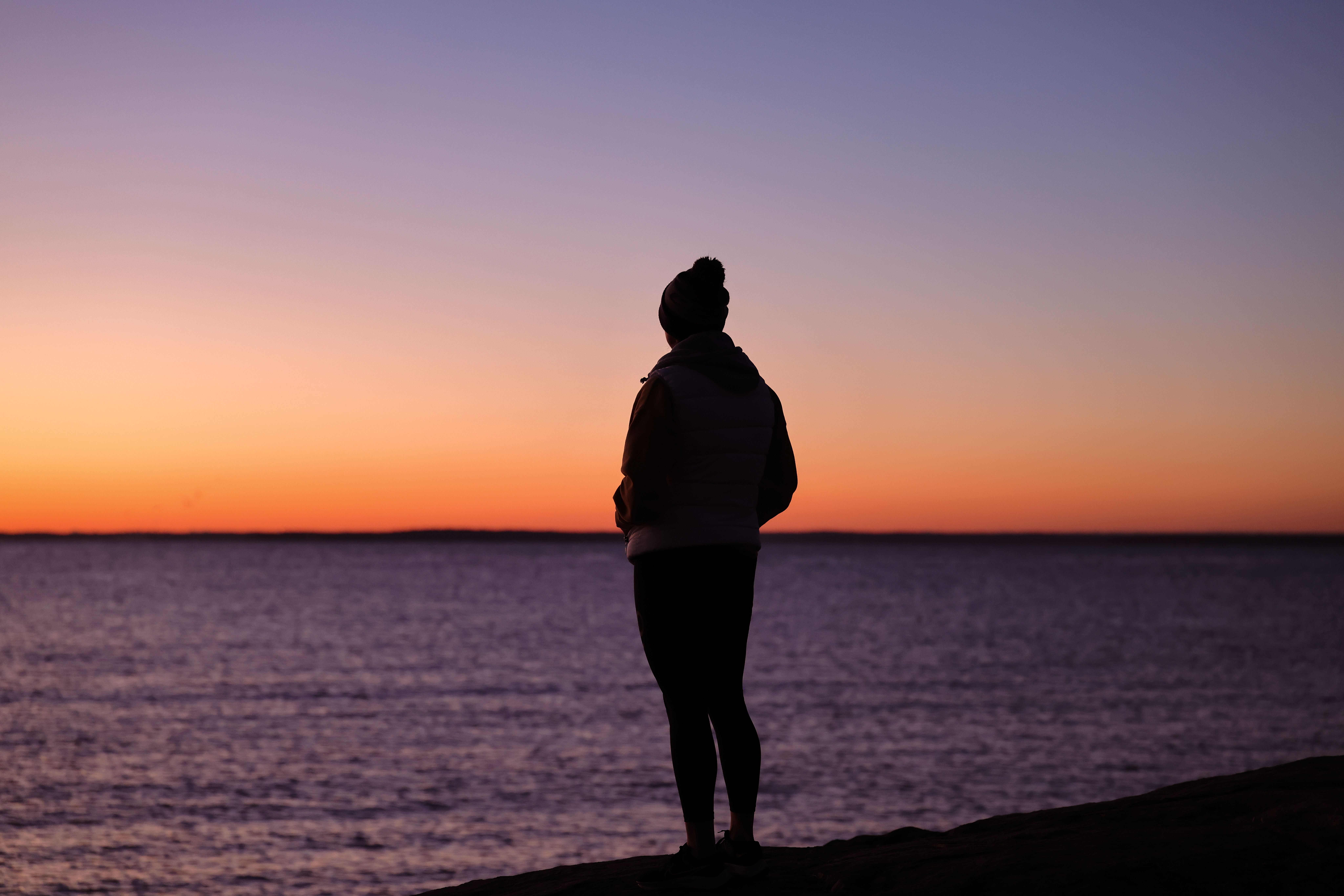 Person Standing Next to Tree · Free Stock Photo